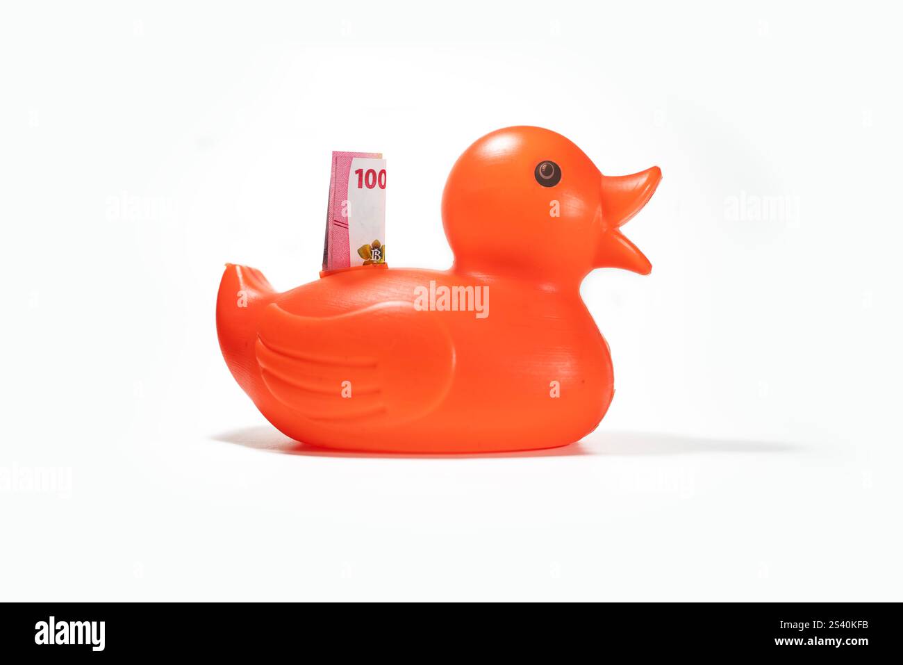 Red Duck Money Storage Box. The photo focuses on money and has a white ...