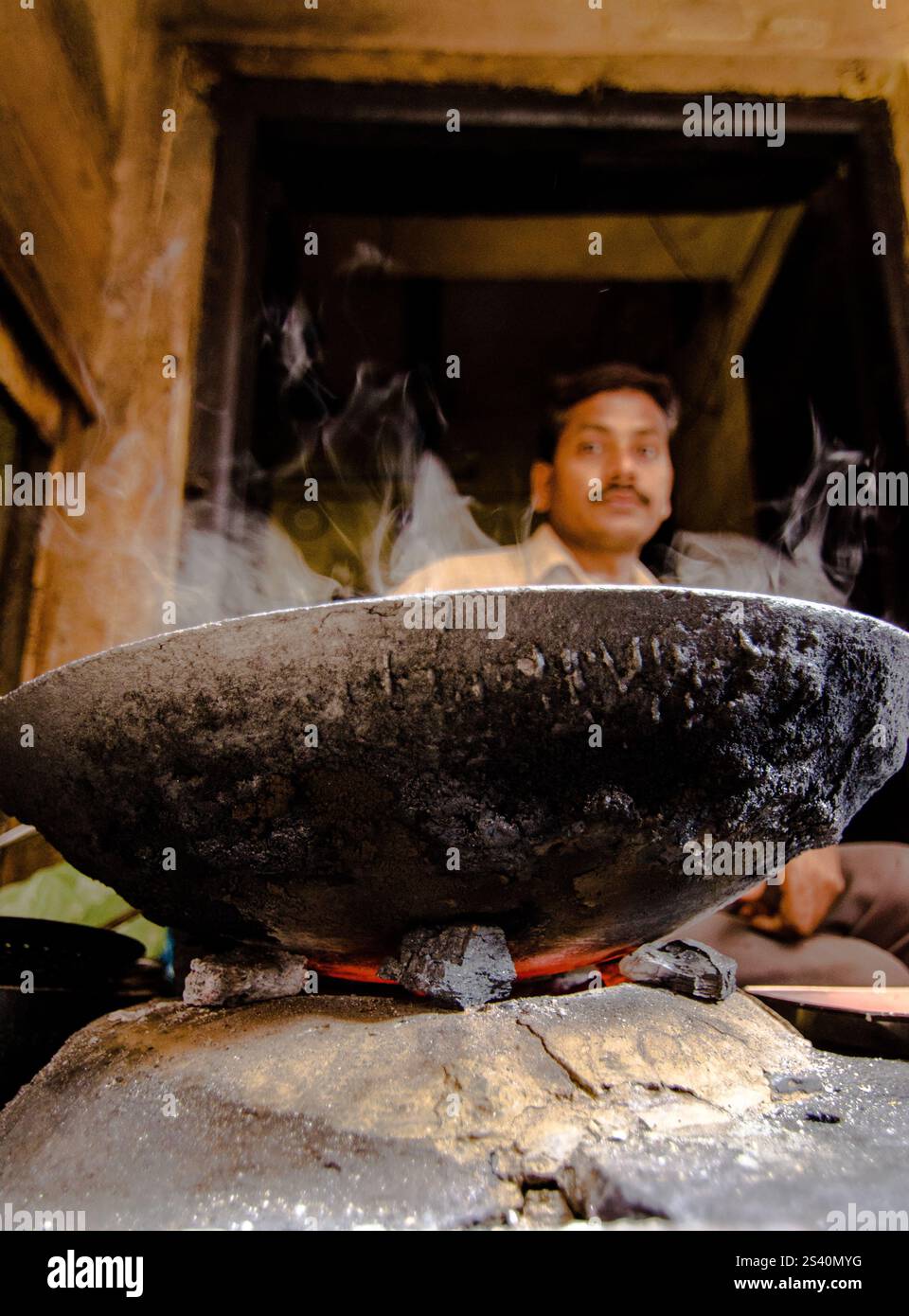 Refreshing drinks are served in traditional glasses at a busy market in ...