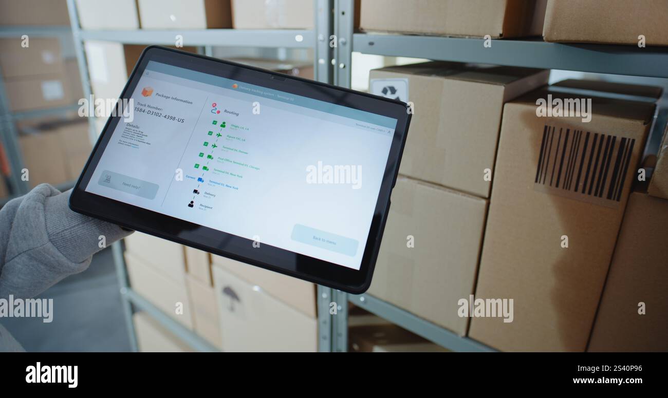 Postal Warehouse Associate Scans QR Code on Cardboard Box with Barcode ...