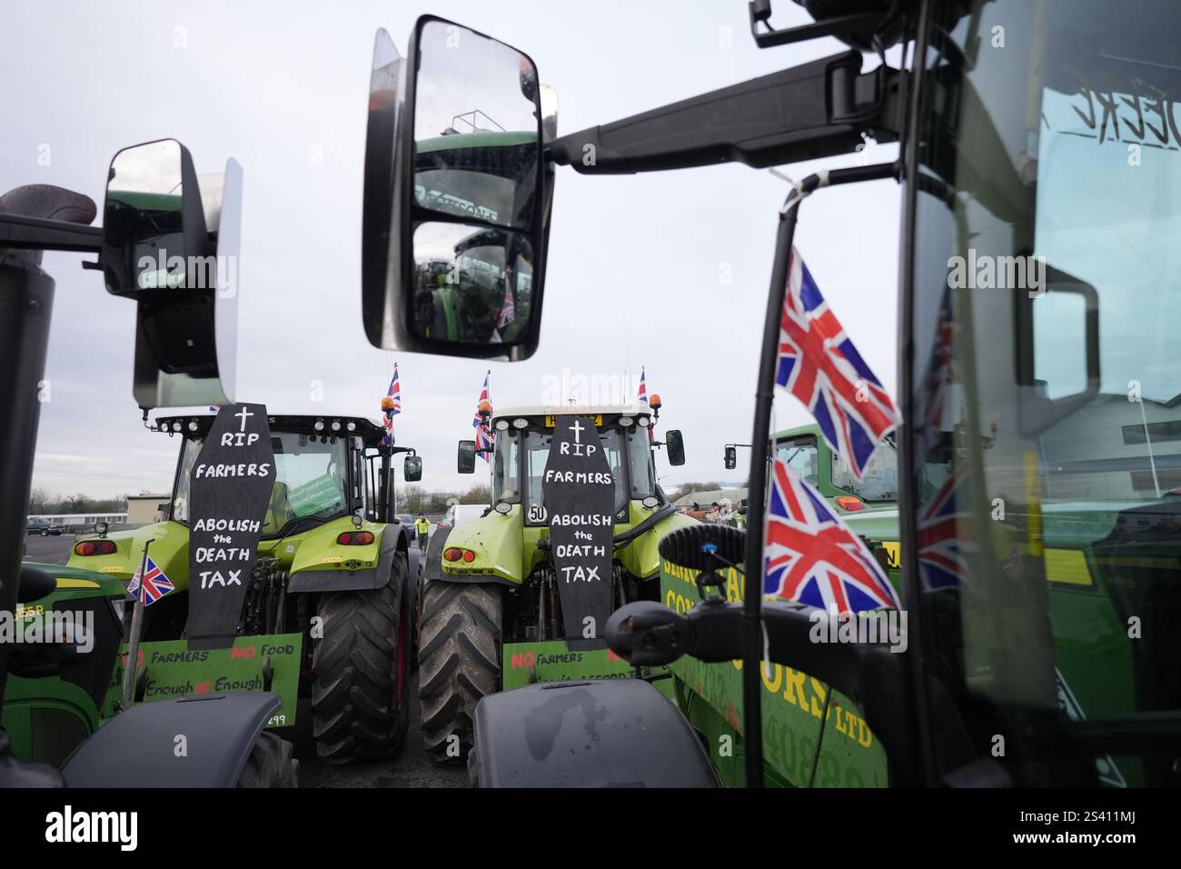 Tractors are lined up at Thruxton Race Circuit, Hampshire, ahead of a ...