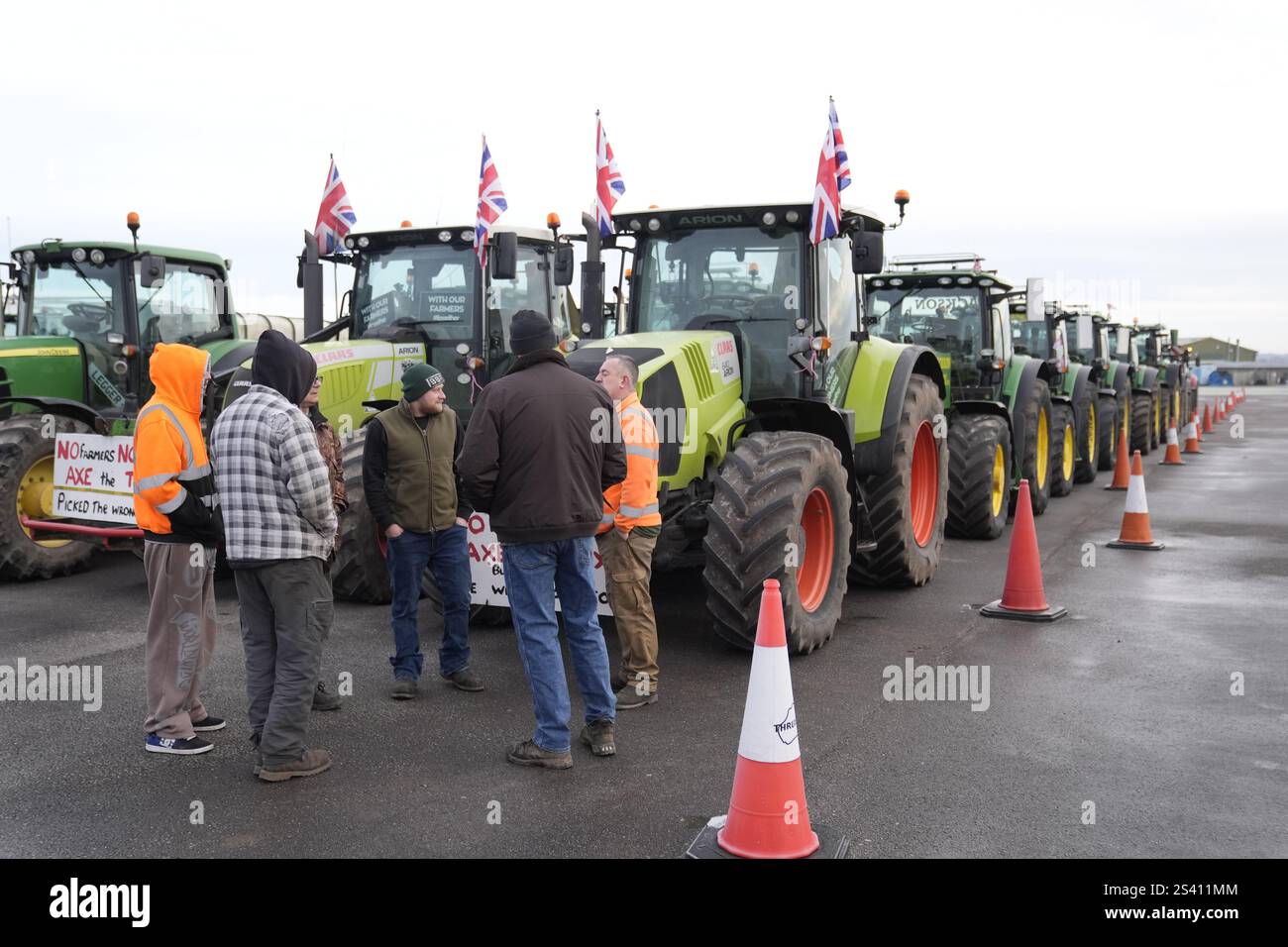 Tractors are lined up at Thruxton Race Circuit, Hampshire, ahead of a ...