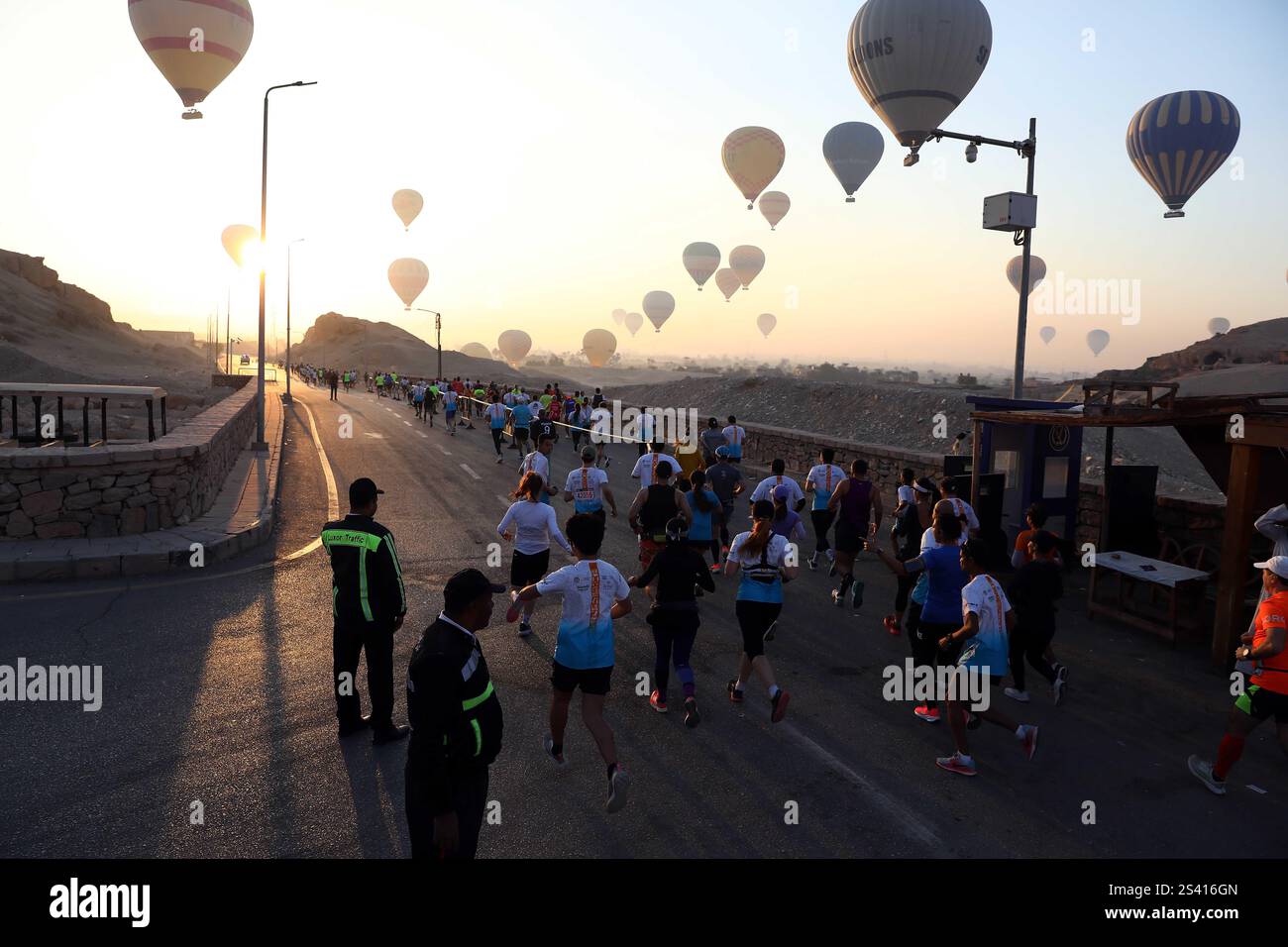 Luxor, Egypt. 10th Jan, 2025. Contestants run during the Egyptian ...