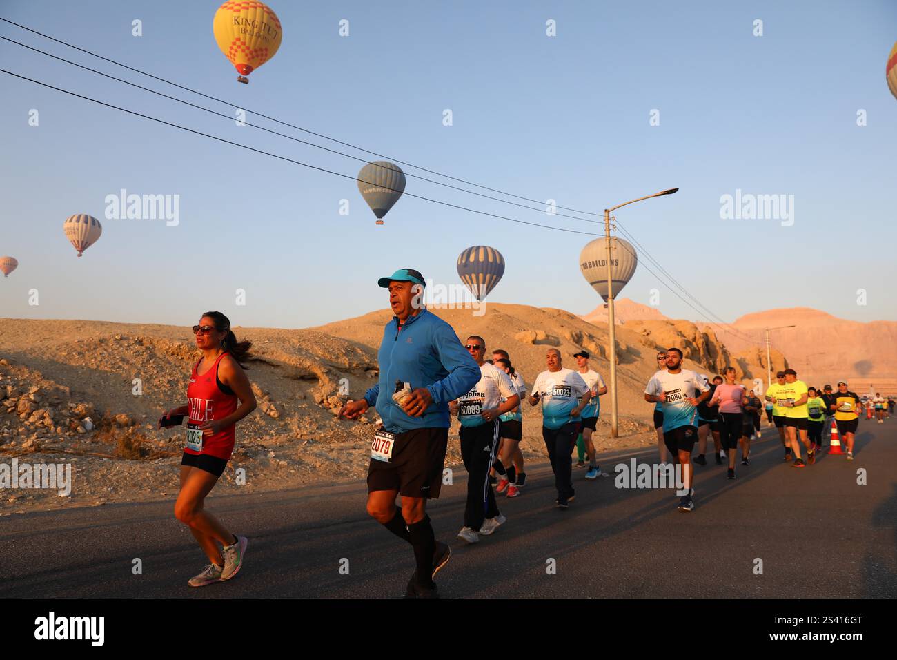 Luxor, Egypt. 10th Jan, 2025. Contestants run during the Egyptian ...