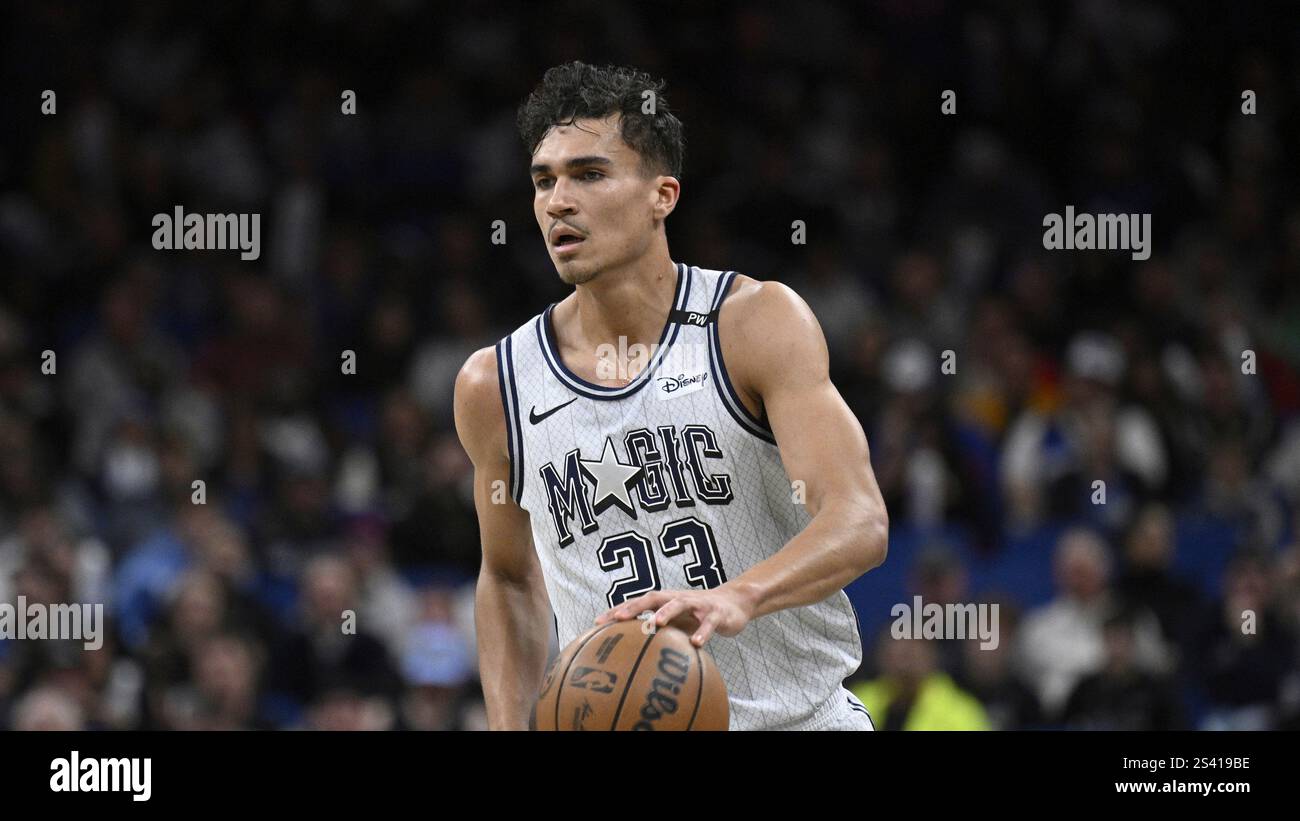 Orlando Magic forward Tristan da Silva (23) brings the ball up the ...