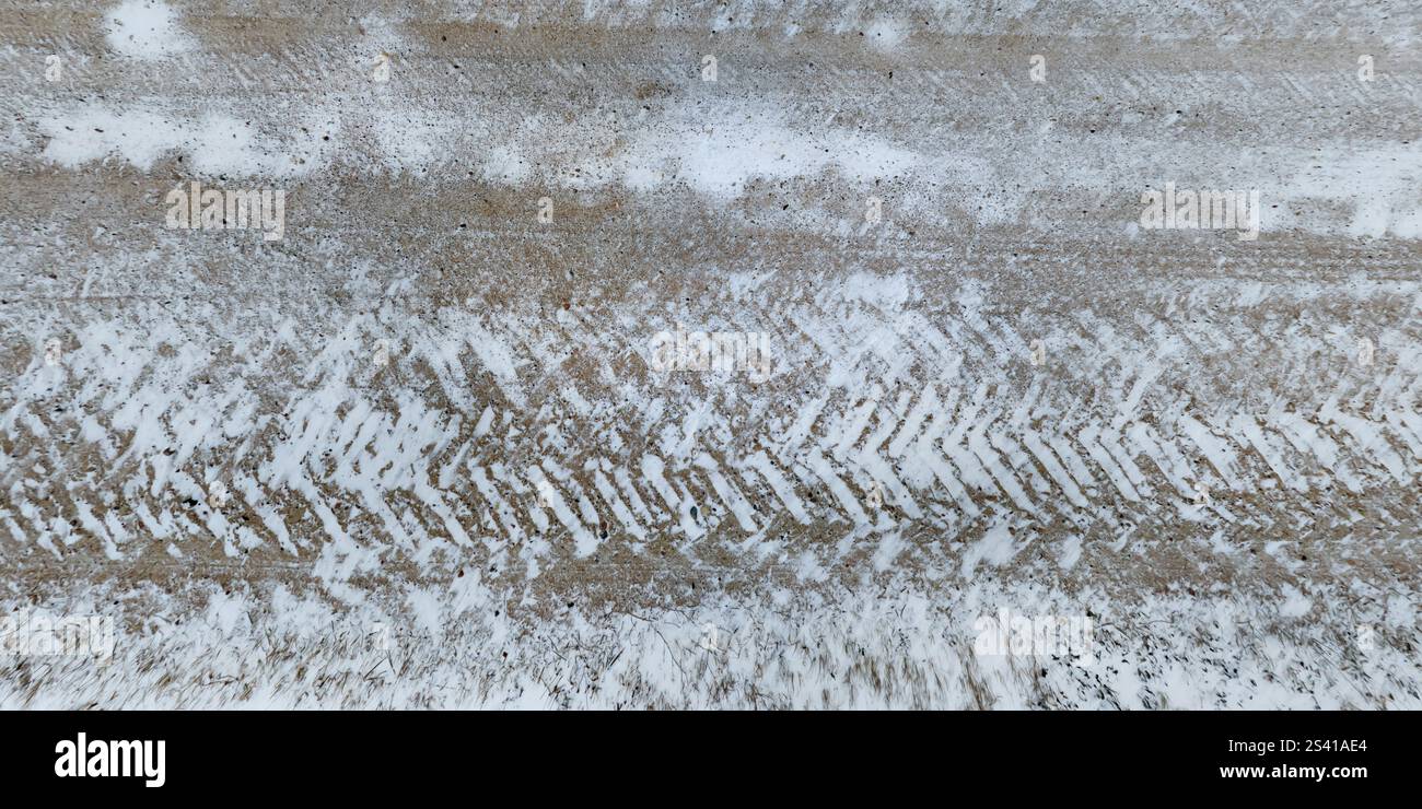 panorama top view from above on texture of snow covered gravel dirt ...