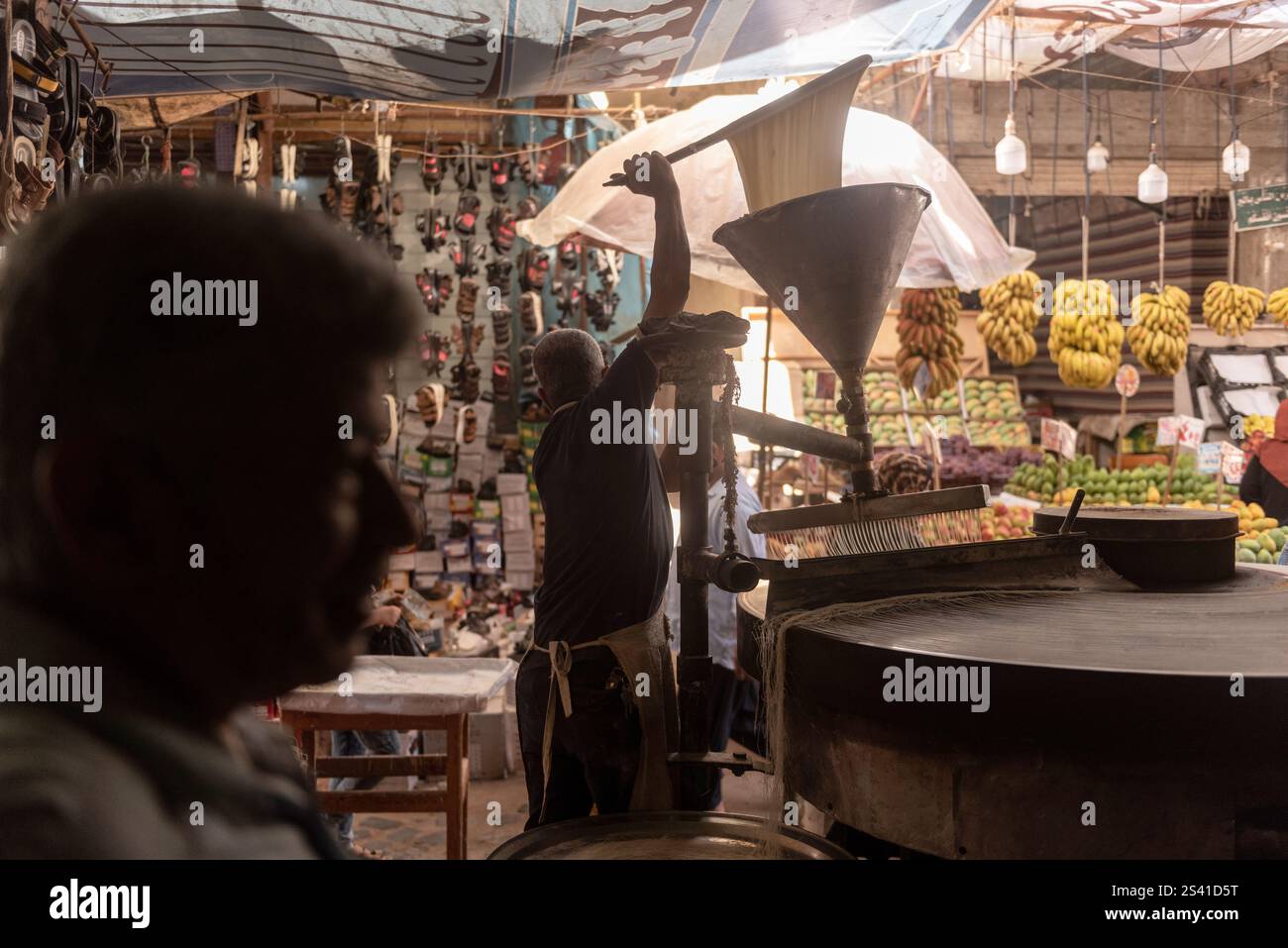 Rashid, Egypt. 27th June, 2024. The preparation of shredded filo dough ...