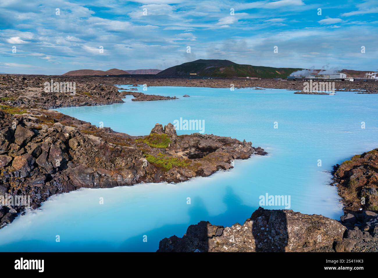 Blue lagoon amidst rocky terrain in natural lava field, Geothermal spa ...