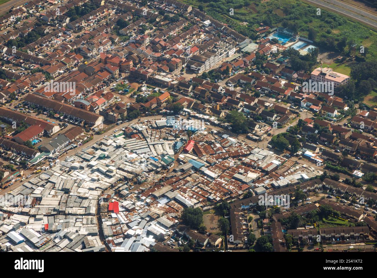 New housing next to the Kibera slum in Nairobi seen from the air Stock ...