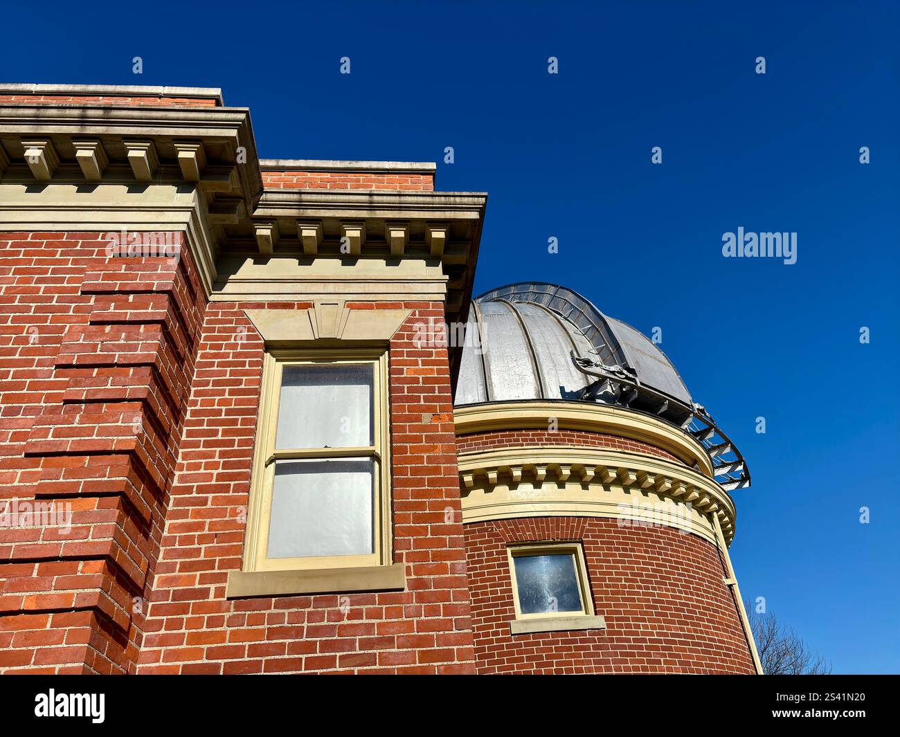 Historic red brick building with a metal dome, Cincinnati Observatory ...