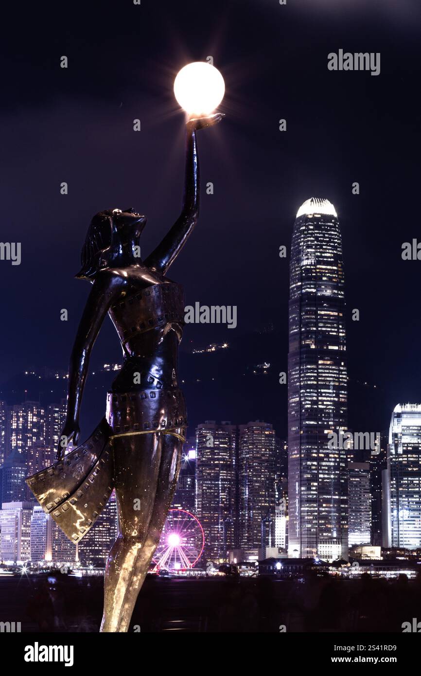 Long exposure photo of the Avenue of Stars statue at night Stock Photo ...