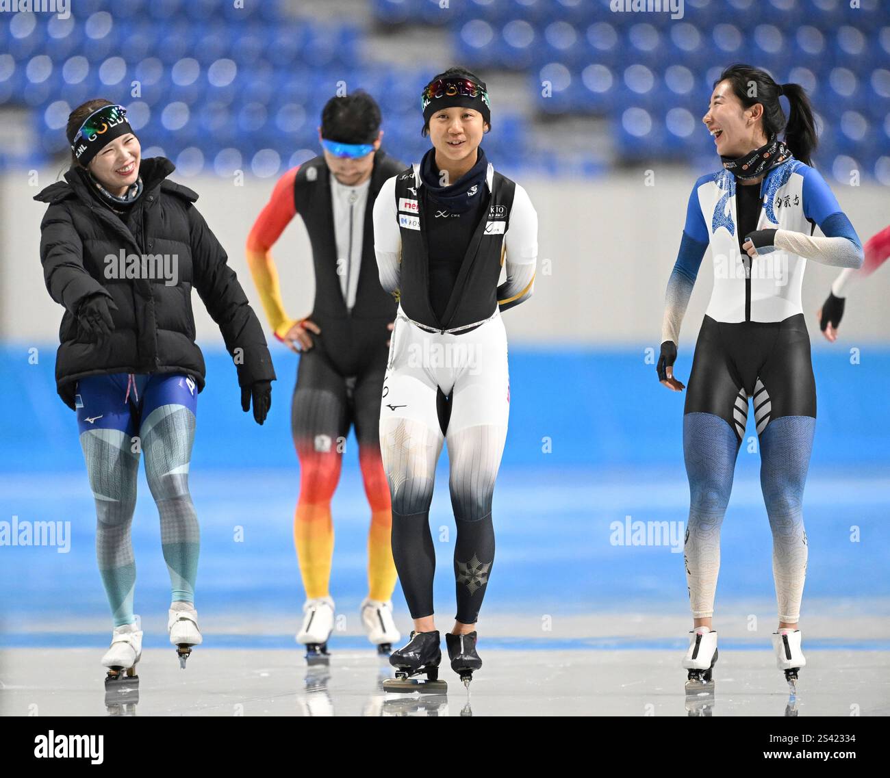 Japanese speed skater Miho Takagi (C) takes part in a practice at ...