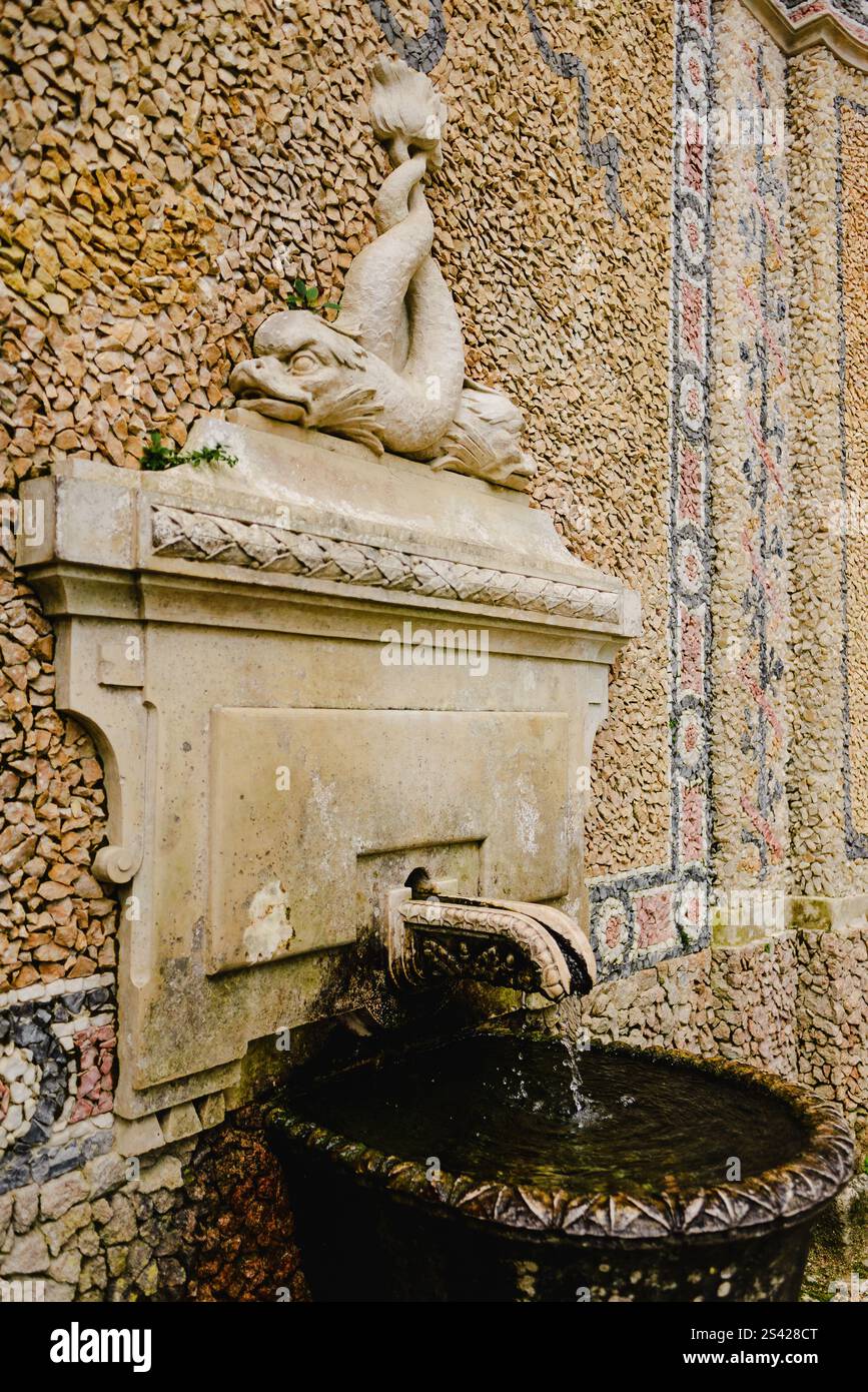 Elegant stone fountain fish hi-res stock photography and images - Alamy