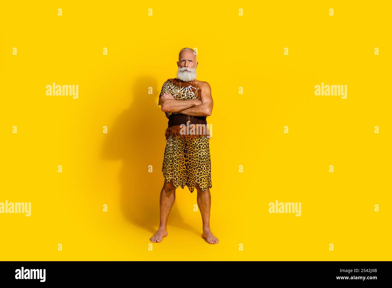 Photo of strong caveman cross hands standing look feel dangerous savage ...