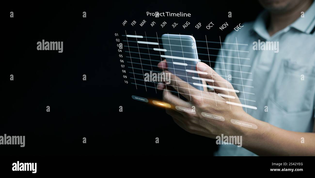 Project manager planning and schedule:. A man, with his smartphone ...
