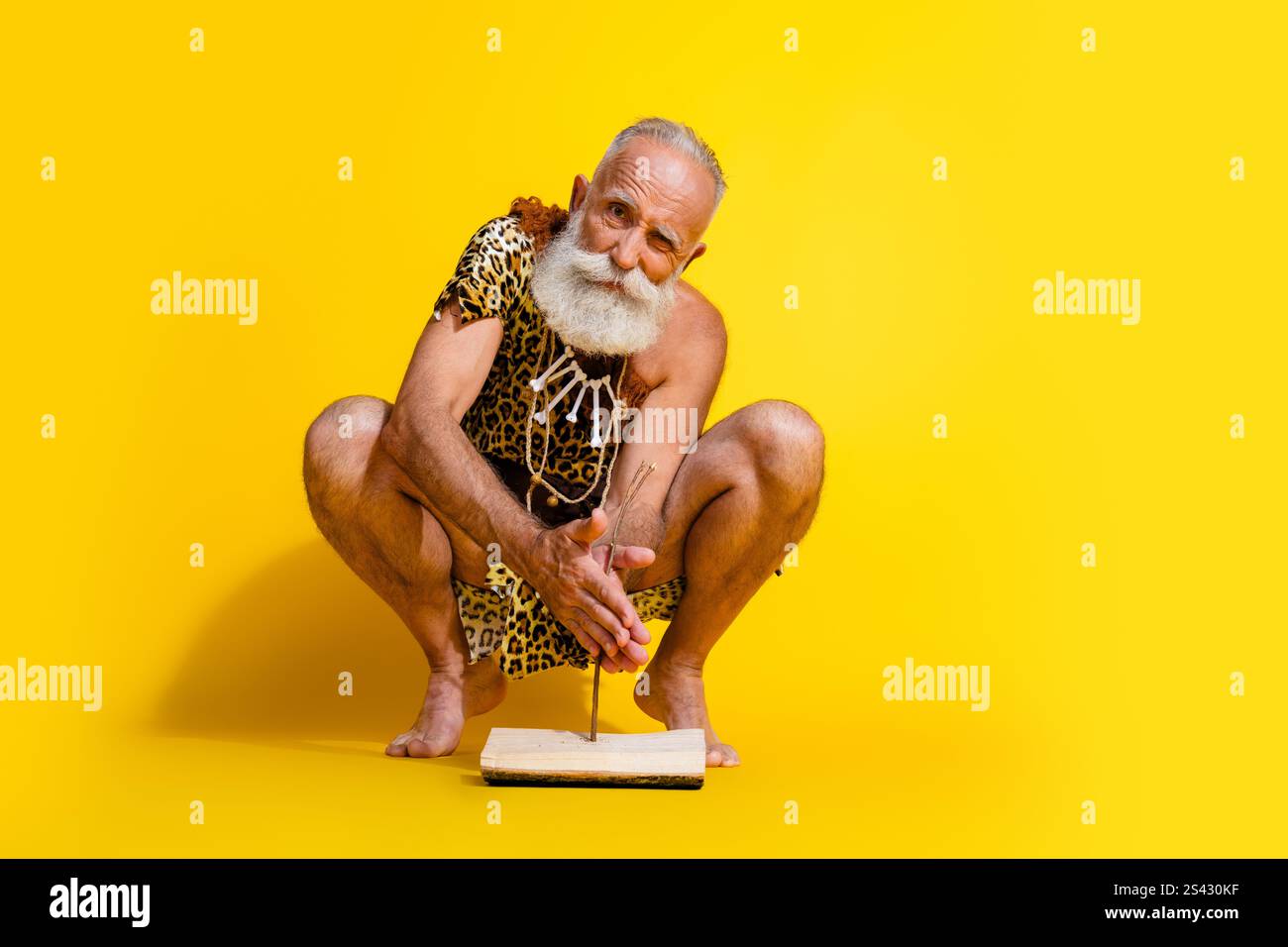 Full size photo of ancient aged caveman drill stick make fire leopard ...