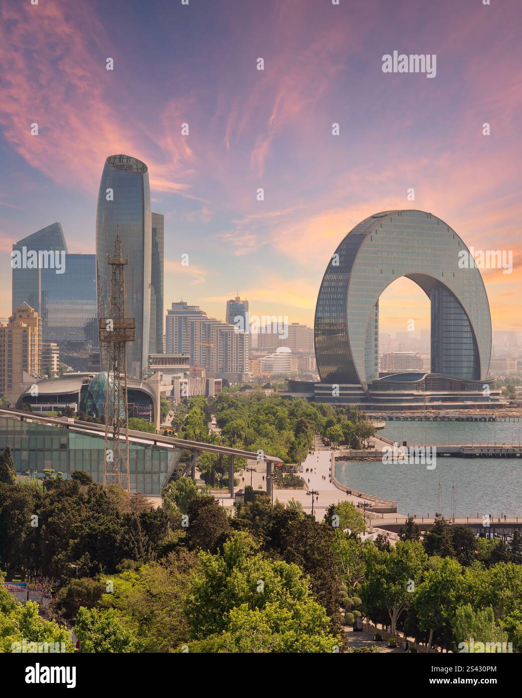 Baku, Azerbaijan - May 10, 2024: Skyline of the city showcases the Parachute Tower and the ...