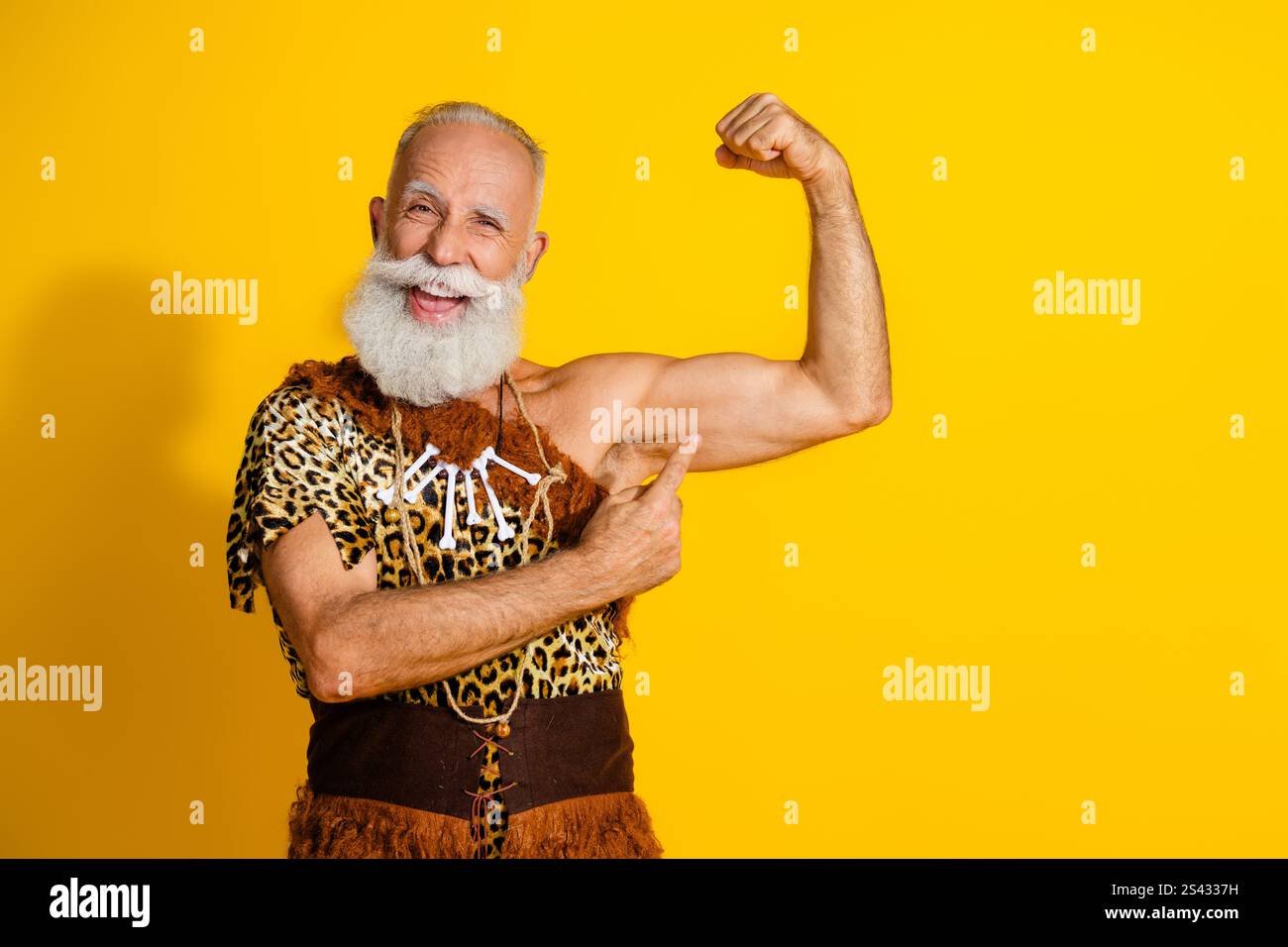 Photo of excited caveman pointing muscles hands wear animal skin ...