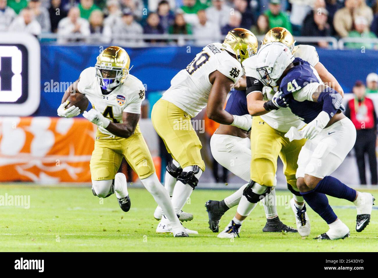 Miami Gardens, Florida, USA. 09th Jan, 2025. Notre Dame running back Jeremiyah Love (4) runs ...