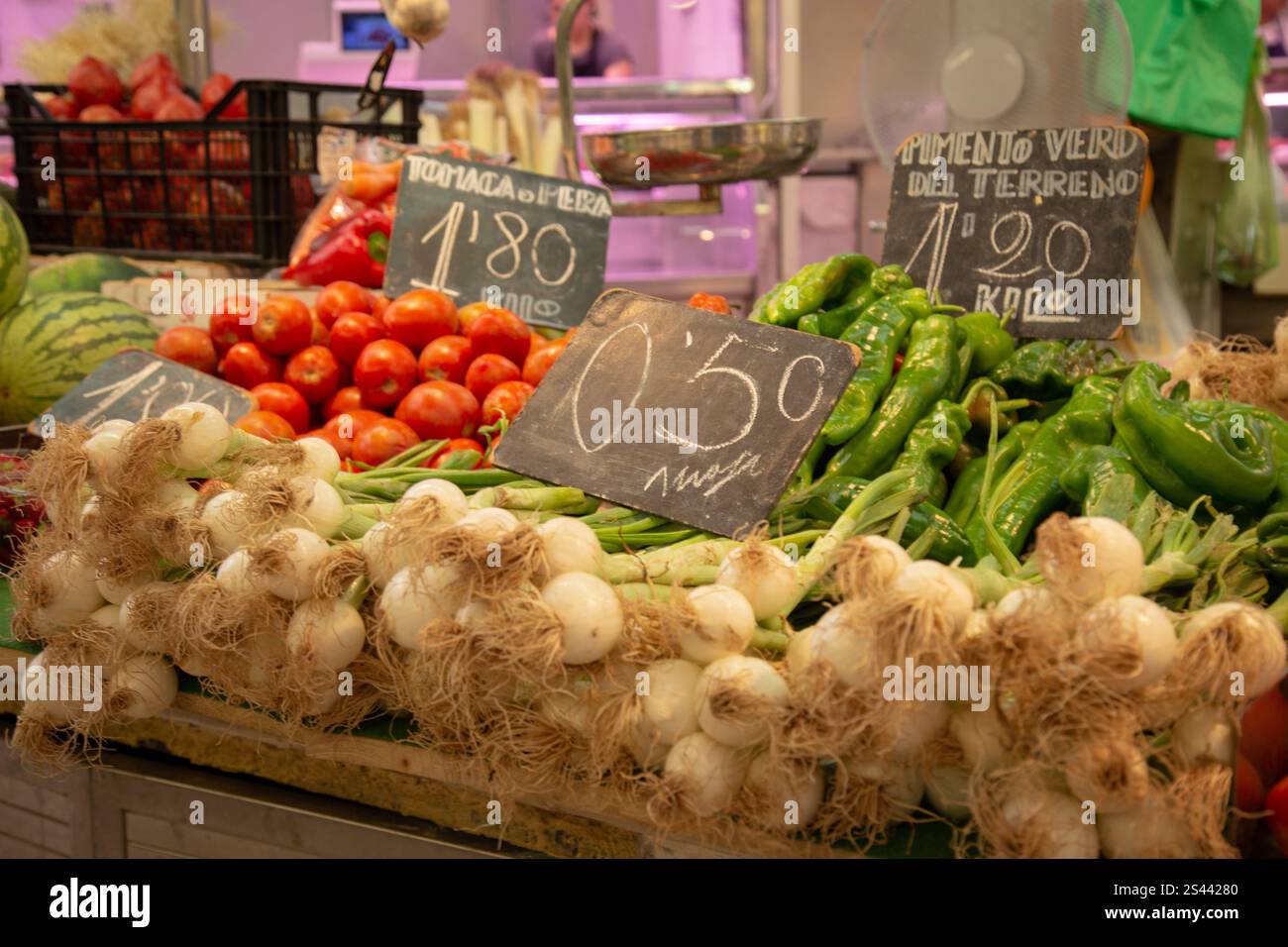 A stall full display full of every day vegetables showing prices Stock ...