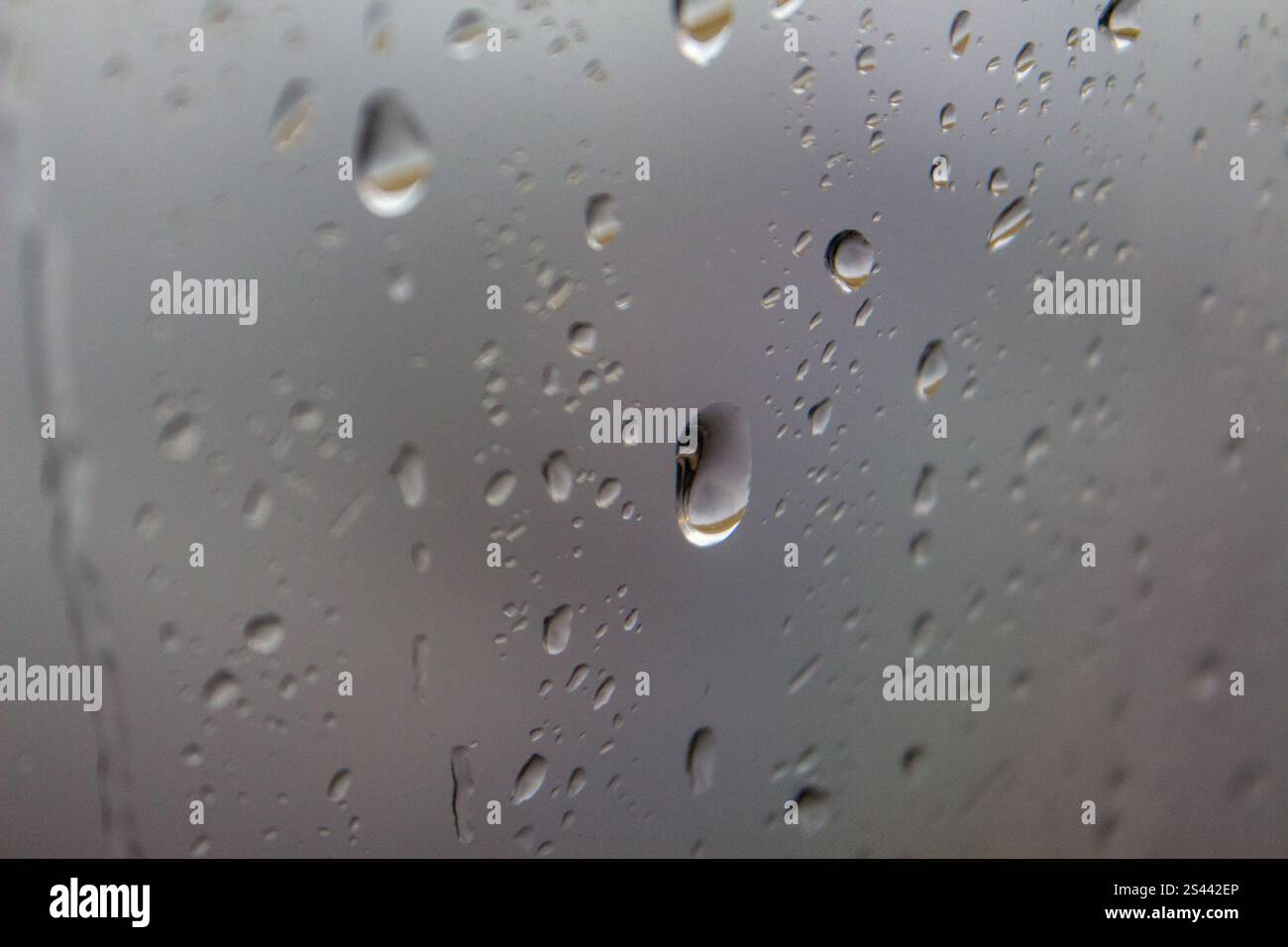 Water droplets on a cold airplane window Stock Photo - Alamy