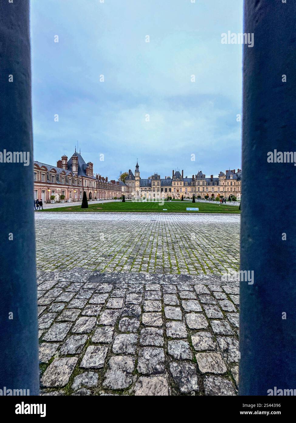 View of the historic courtyard at a French chateau featuring ...