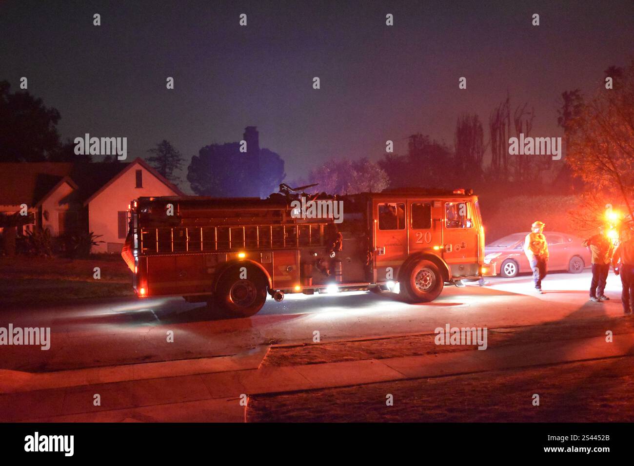 Altadena, USA. 9th Jan, 2025. Firefighters work in Altadena, Los ...