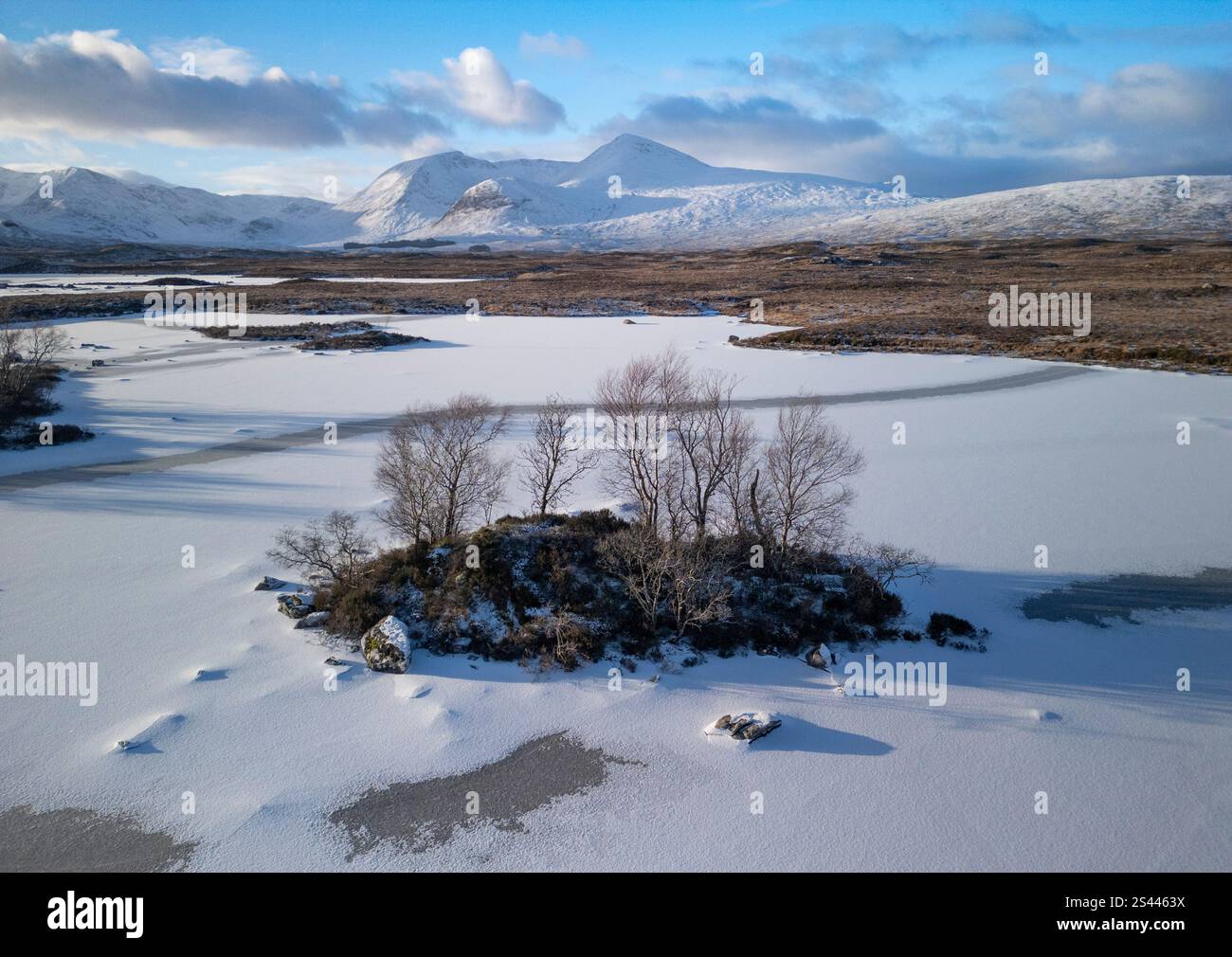 Sub zero temperatures in the Scottish Highlands cause the small lochs ...