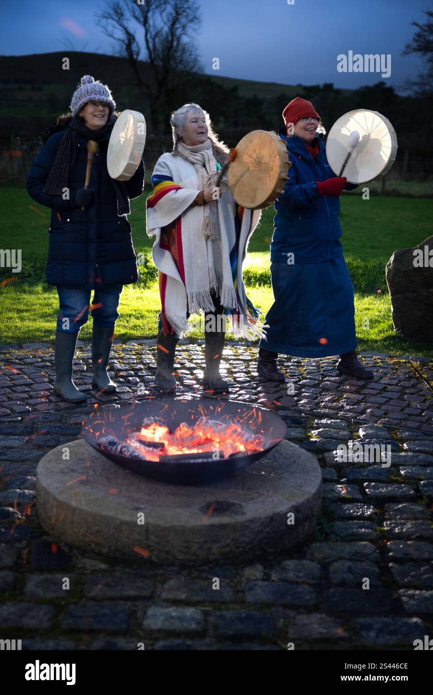 21/12/24 Members of the Earth Appreciation Society gather around a fire ...