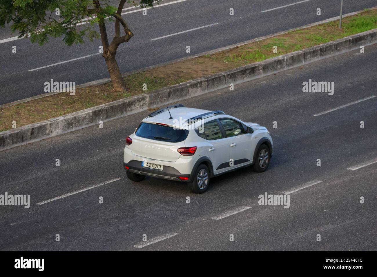 Modern white dacia sandero stepway driving on an asphalt road Stock ...