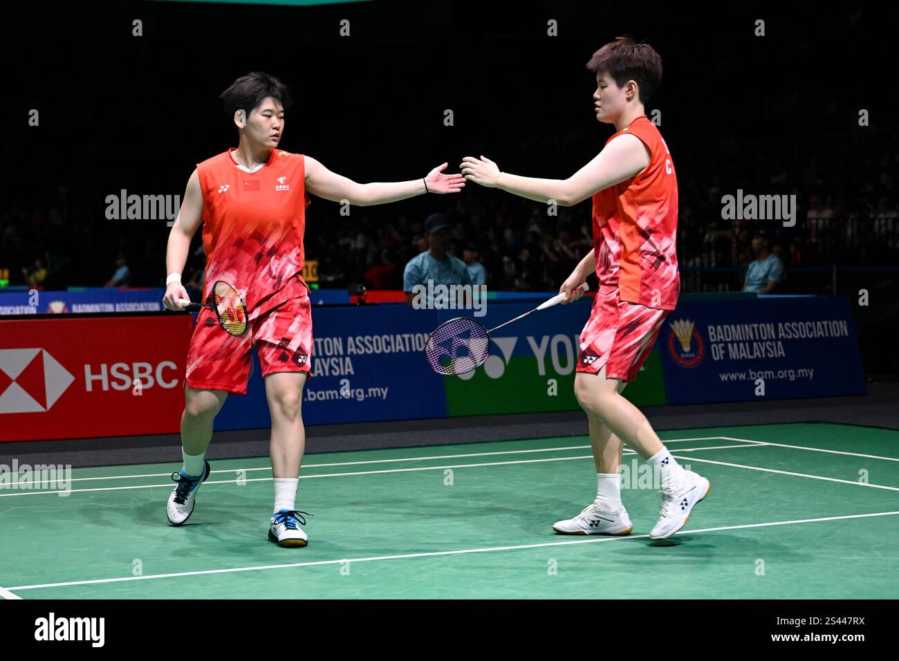 Kuala Lumpur, Malaysia. 10th Jan, 2025. Liu Shengshu/Tan Ning (L) of China react during the ...