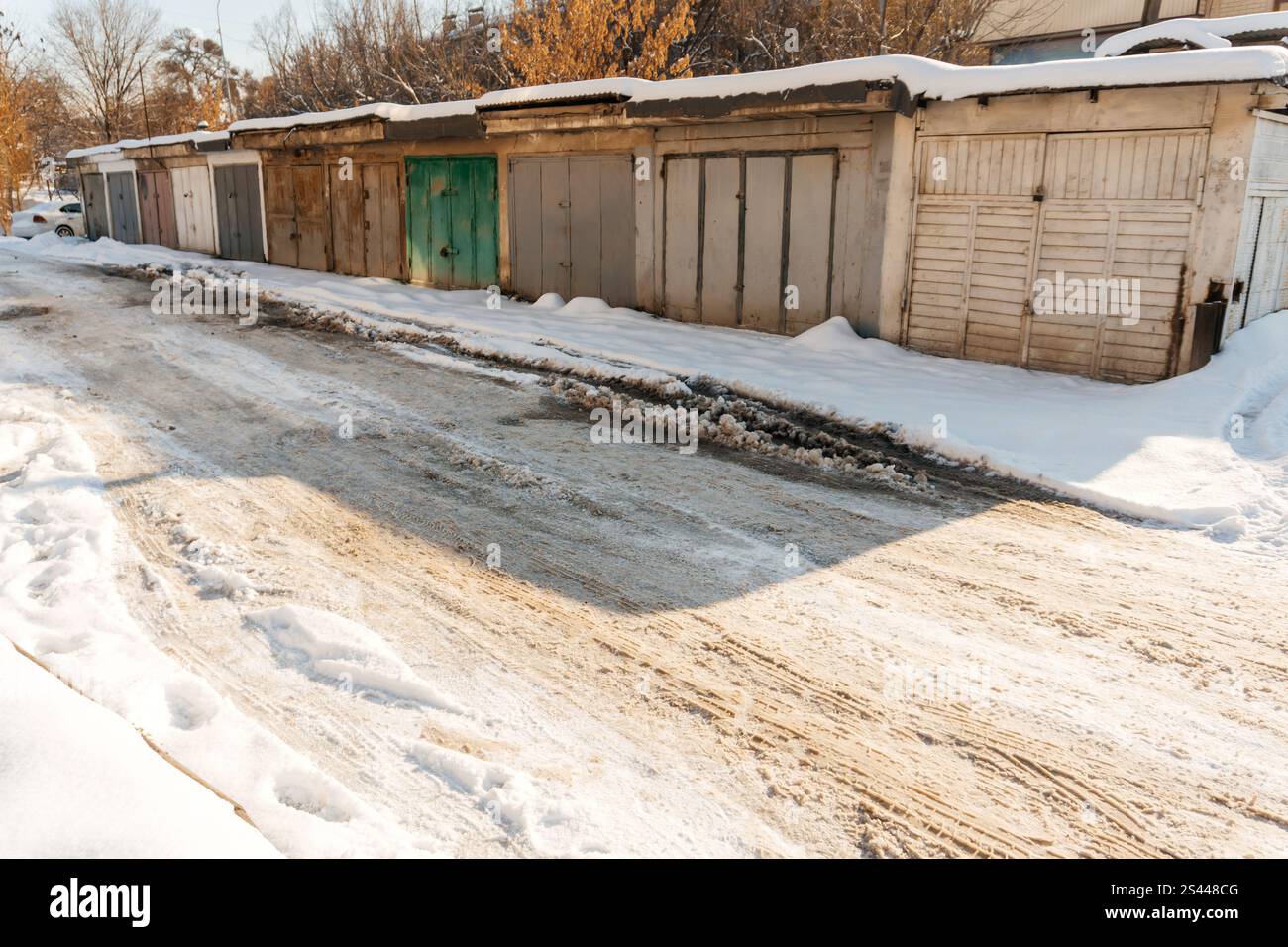uncleaned roads after a winter snowfall in Kazakhstan. highway covered ...
