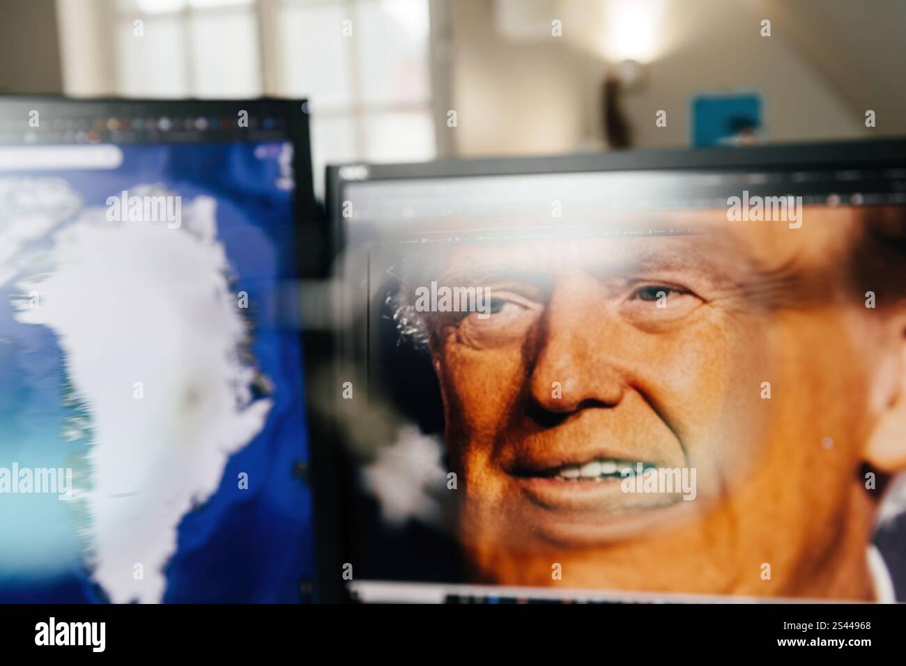Paris, France - Jan 1, 2025: A close-up view of two monitors, one ...