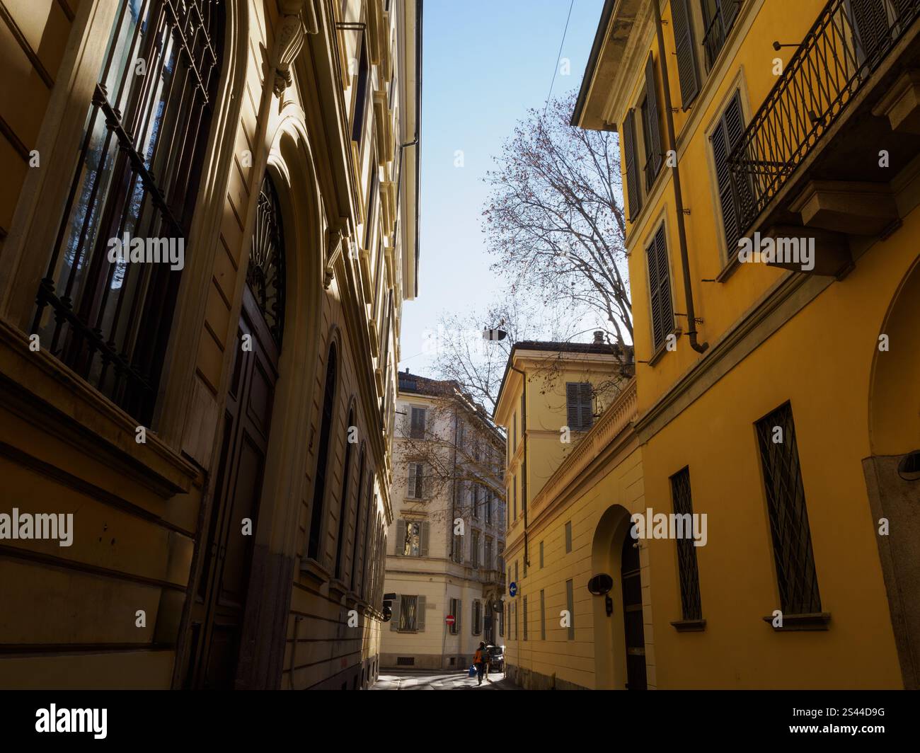 Old buildings along via Cappuccio, historic street of Milan, Lombardy ...