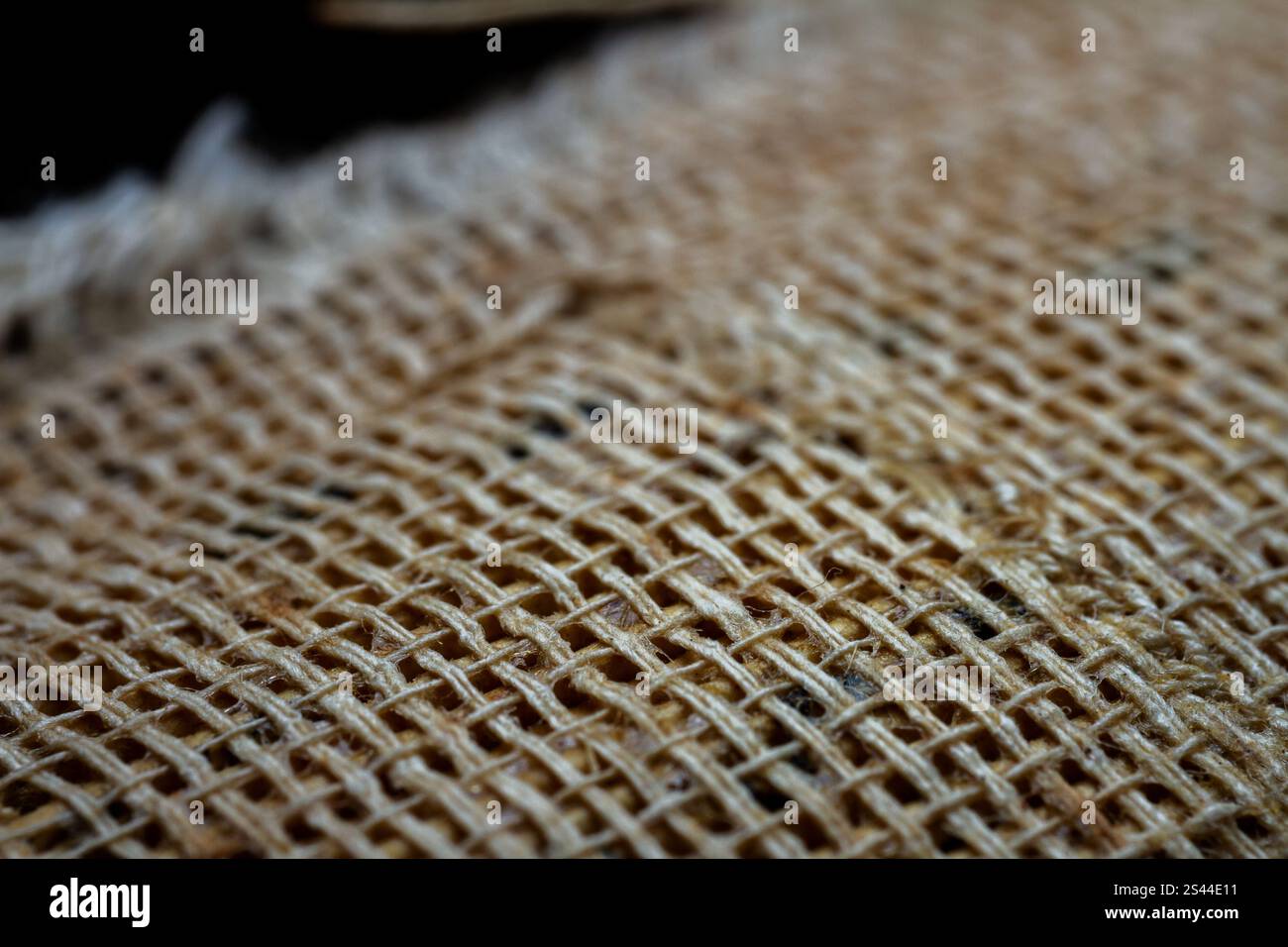 Extreme closeup of an old book from the side. Selective soft focus ...