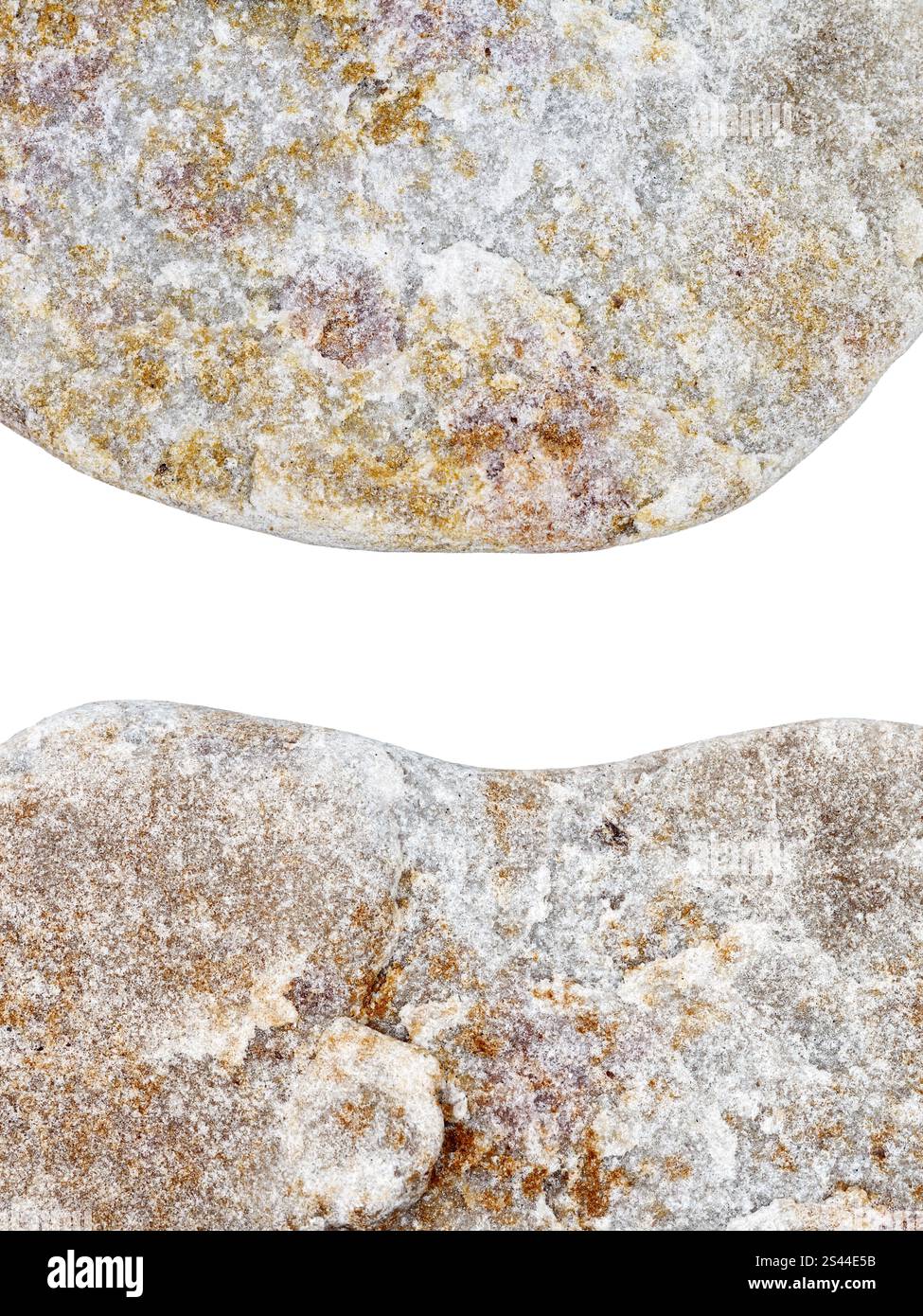 Edges of two pebbles isolated on white background with a space for text ...