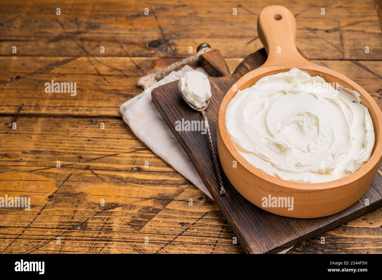 Italian Mascarpone cheese, cream cheese for tiramisu. wooden background ...