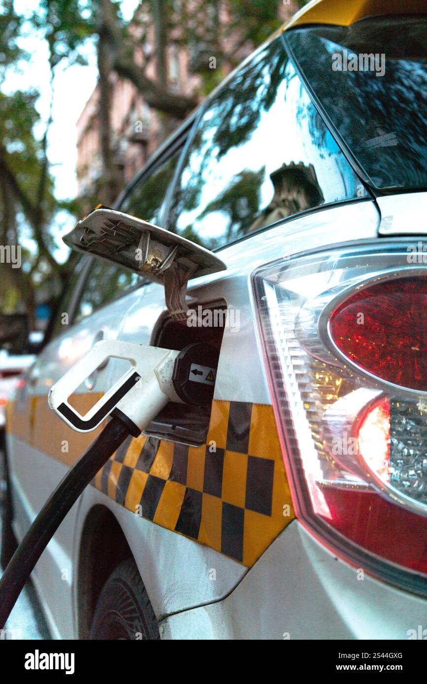 Electric cab that recharges energy at a charging station, renewable ...