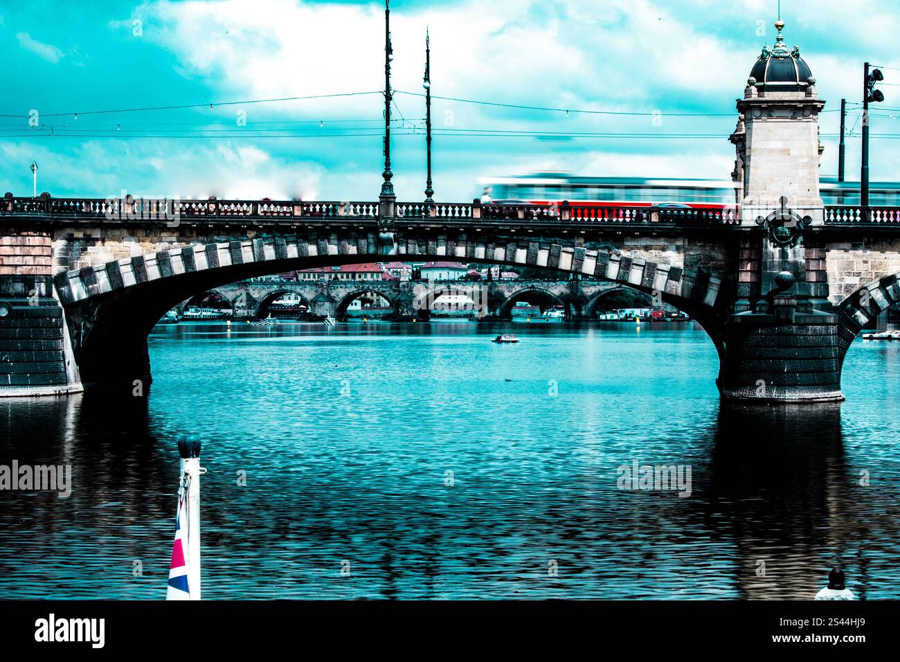 Tramway crossing the Vltava River on a bridge Stock Photo - Alamy