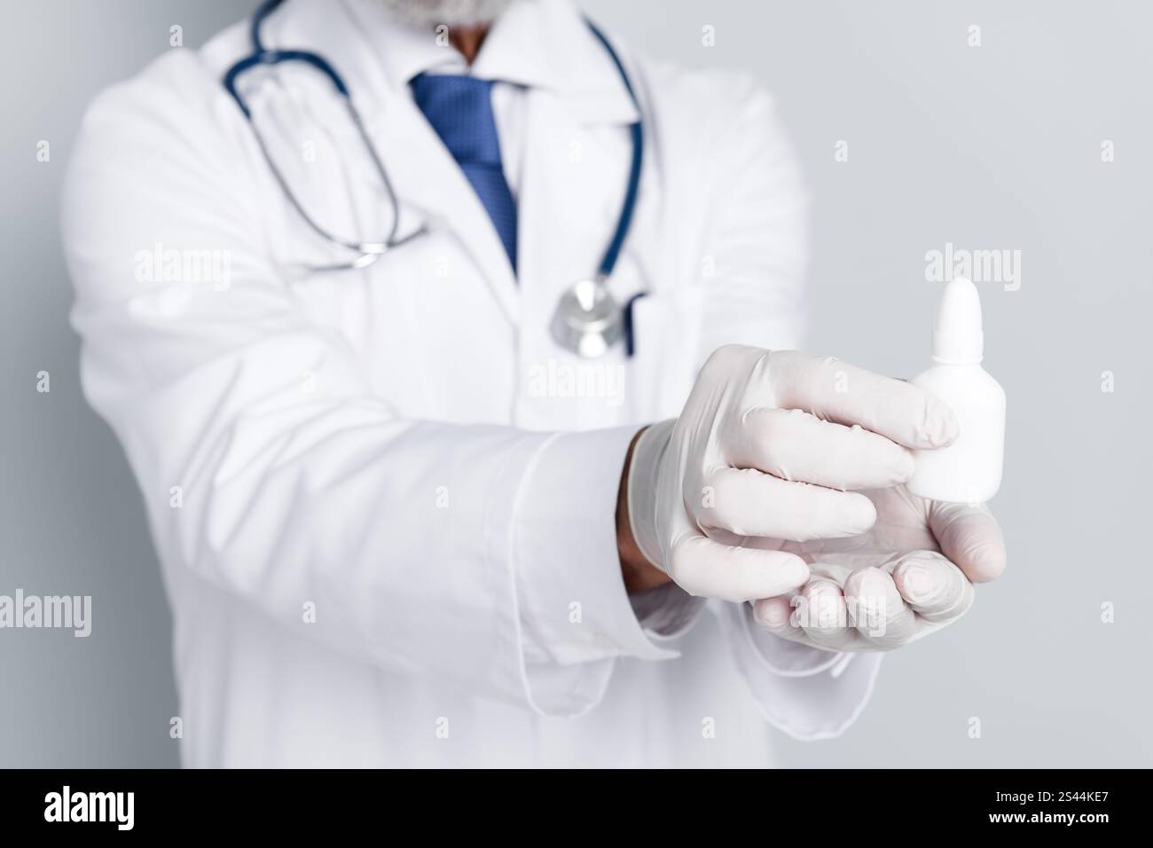 Medical professional demonstrating healthcare tools for proper ...