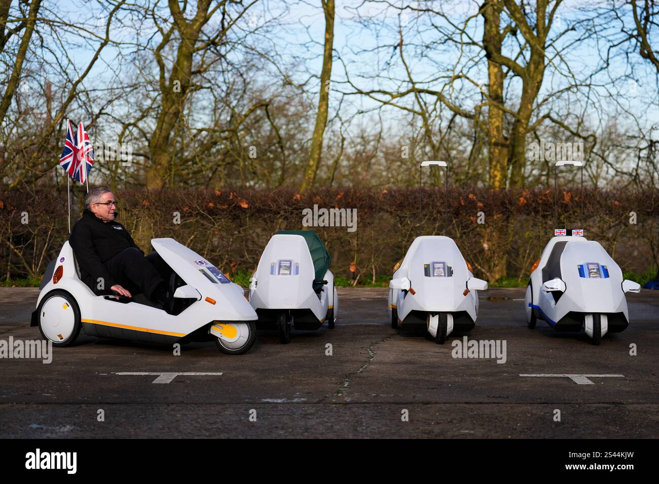 Sinclair C5 enthusiasts at a gathering at Alexandra Palace in London to ...