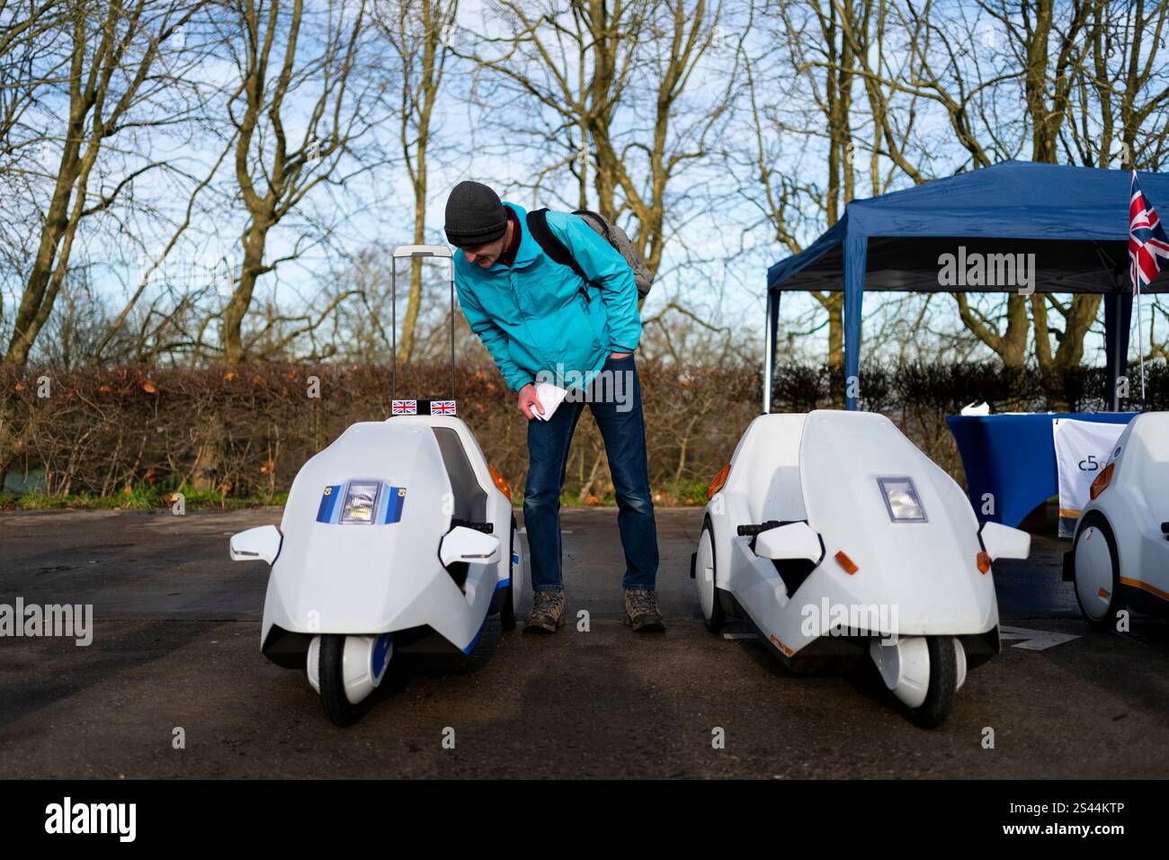 A journalist at a gathering of Sinclair C5 enthusiasts at Alexandra ...