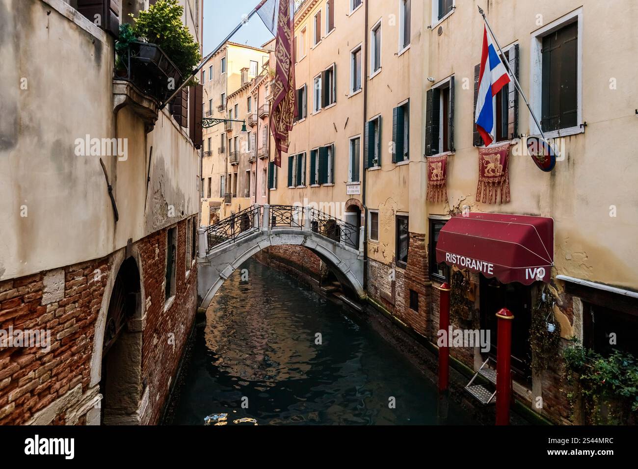 Venice, Italy - December 23, 2023: Typical city canal where boats ...