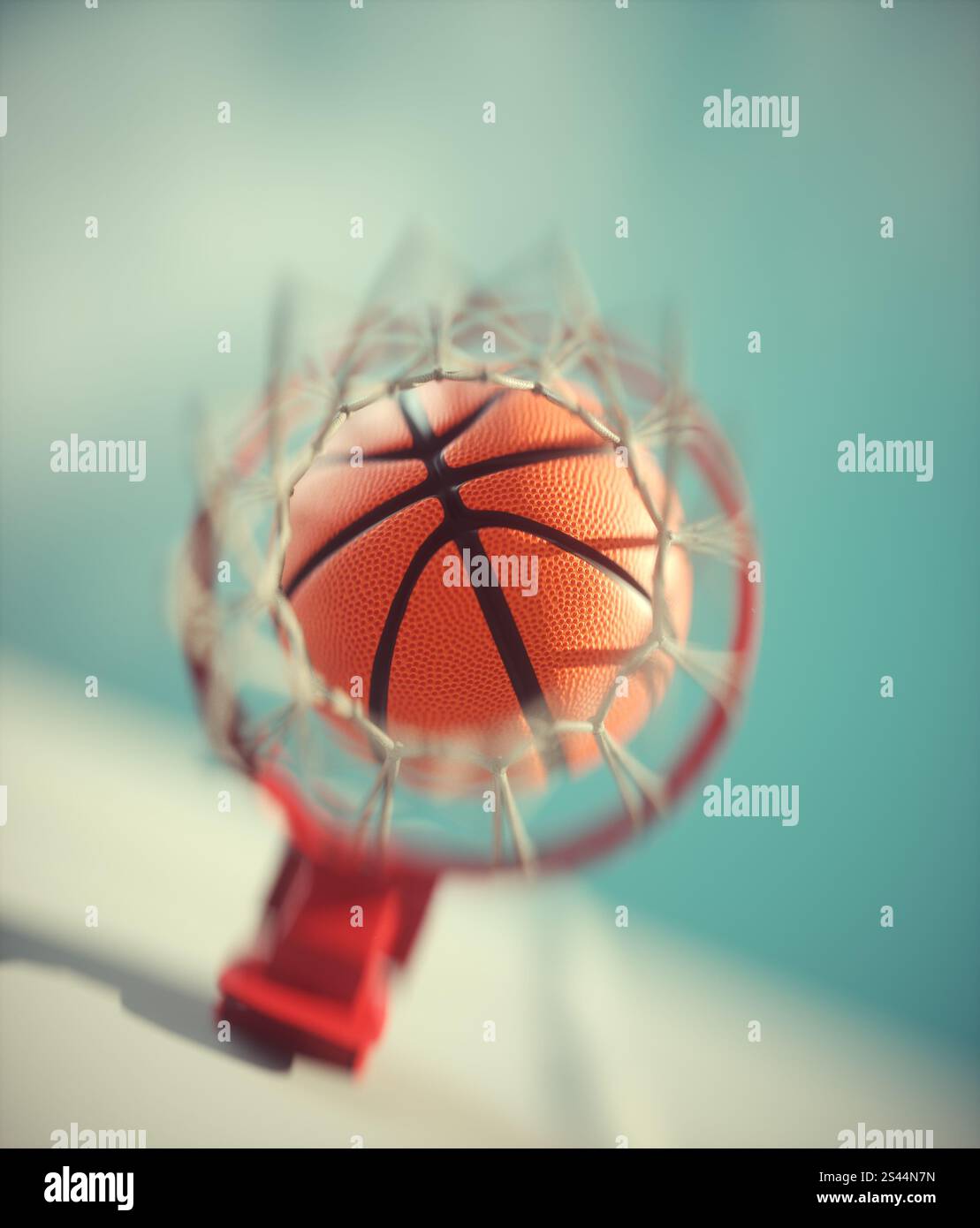 Bottom view of a basketball basket. Ball entering through the hoop ...