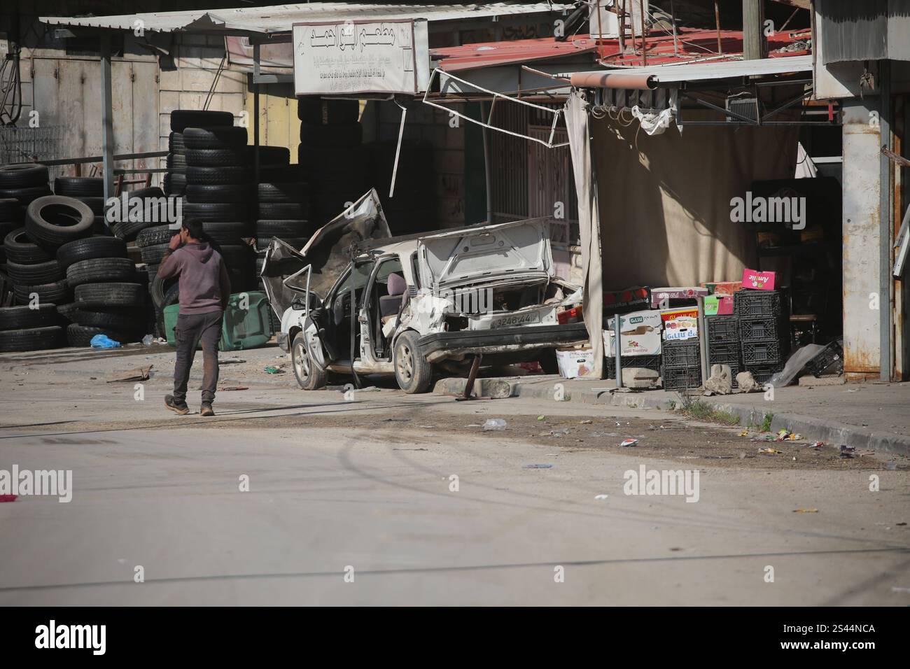 Israeli military vehicles are seen during an Israeli raid in Qabatiya ...