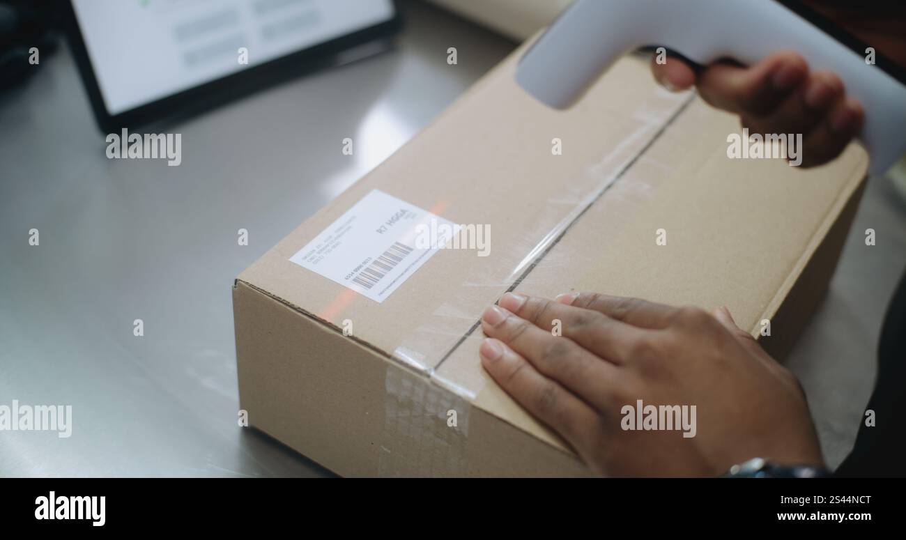 African american warehouse clerk putting hi-res stock photography and ...