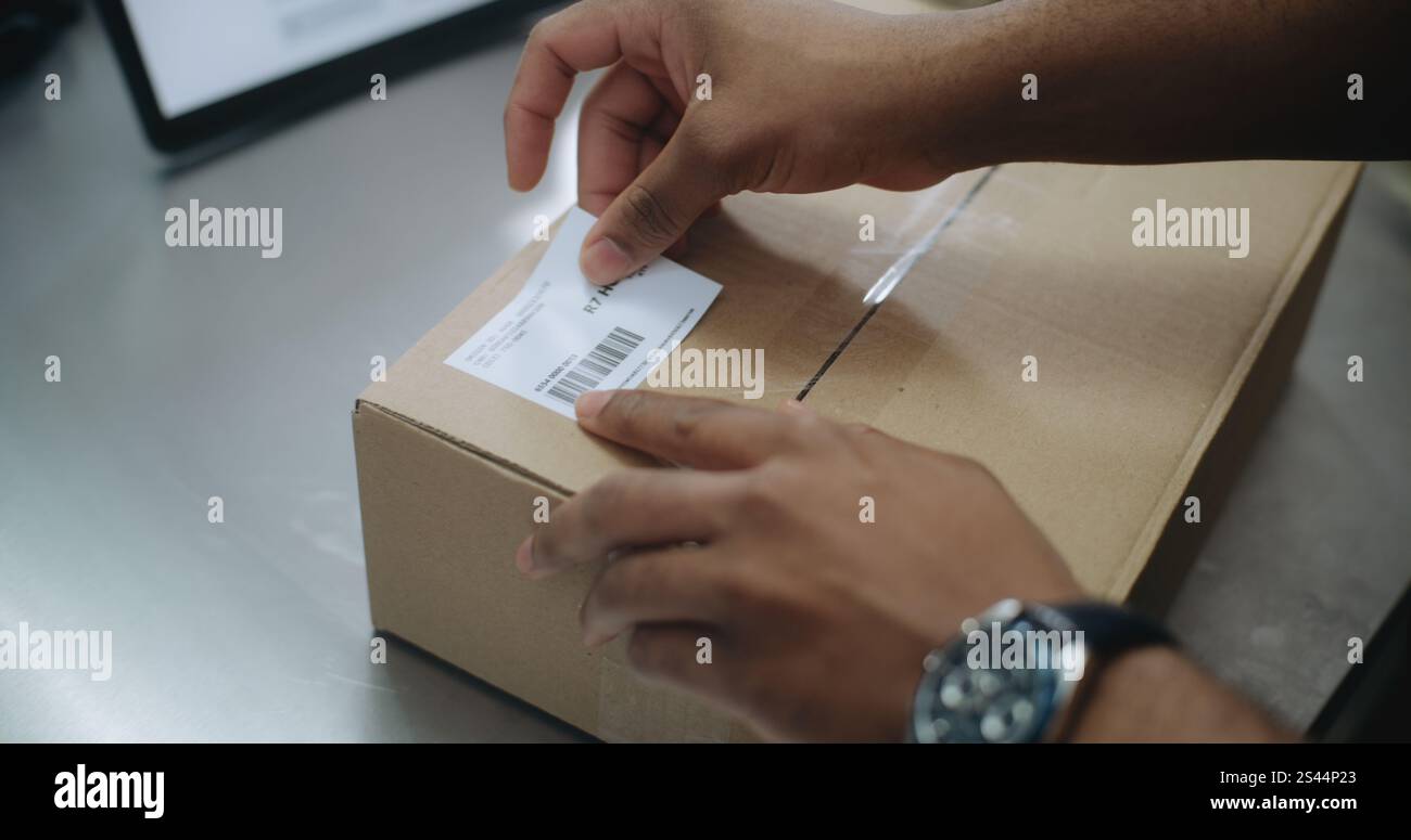 African american warehouse clerk putting hi-res stock photography and ...
