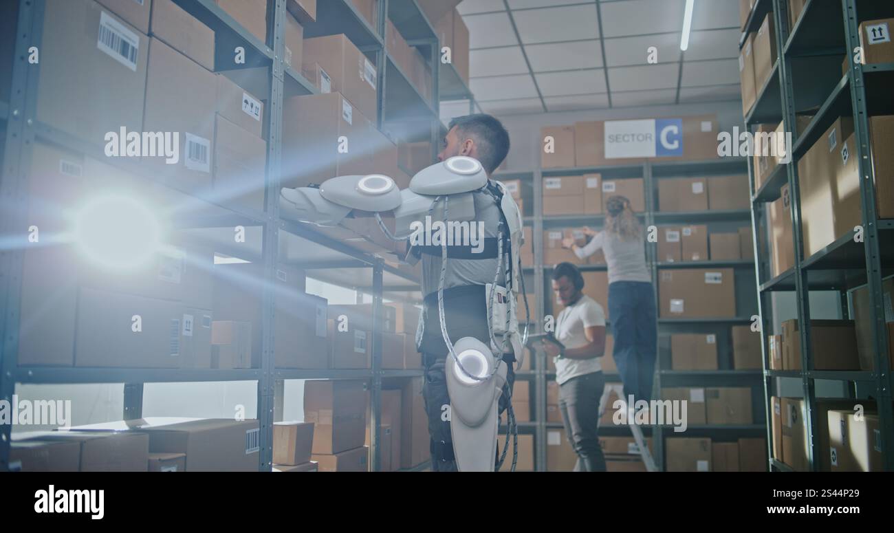 High-Tech Advanced Warehouse: Sorting Center Worker Wearing Futuristic Full Body Powered ...