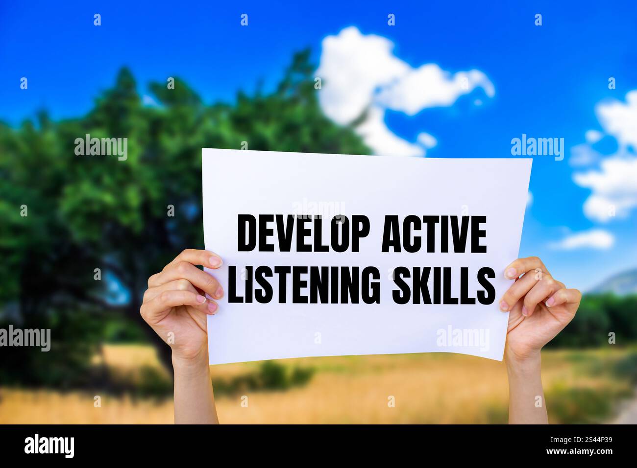 Develop active listening skills message written on white paper with ...