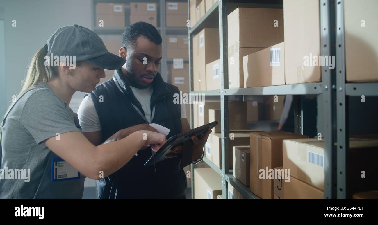 Diverse Warehouse Employees Scanning Cardboard Box with E-Commerce ...