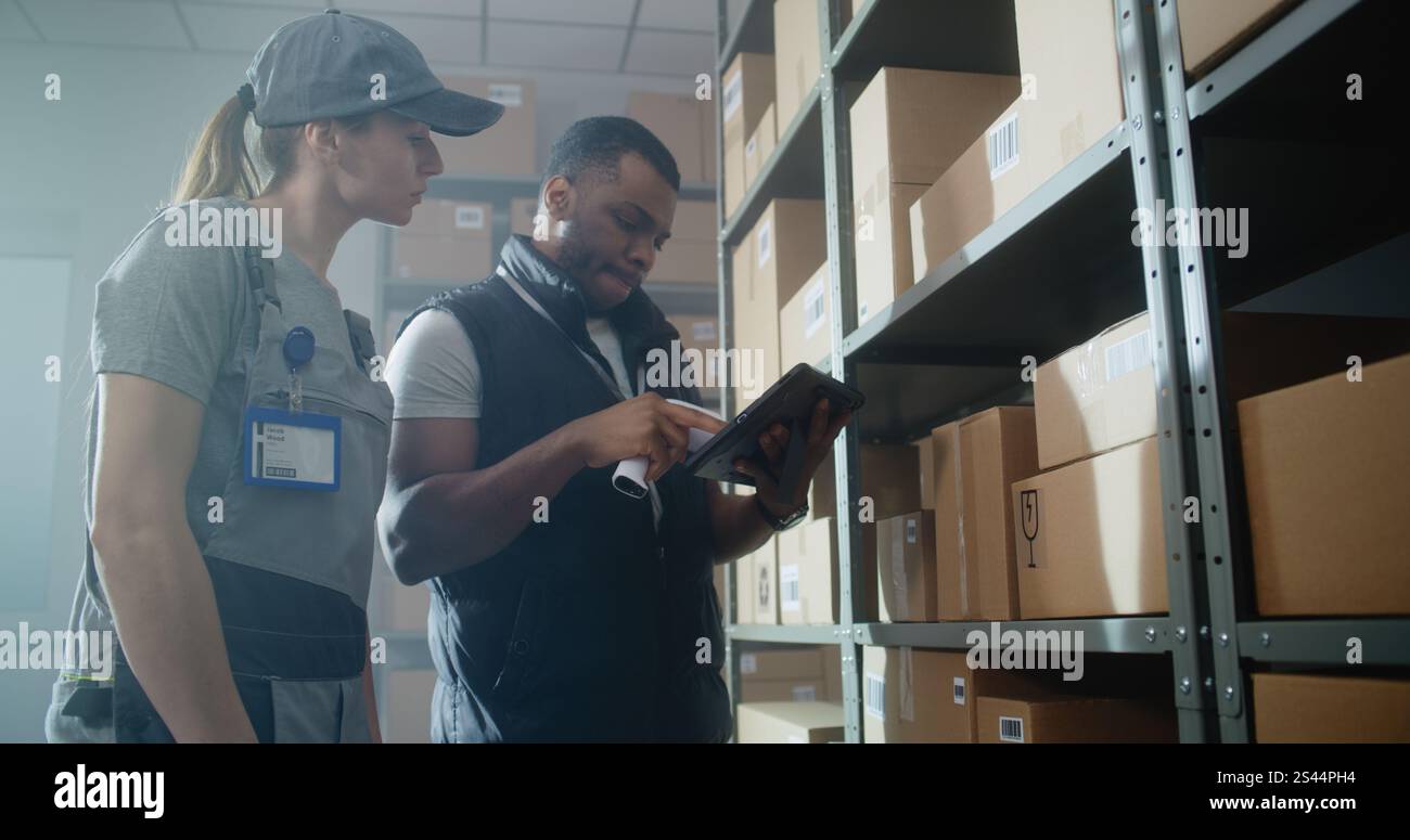 Diverse Warehouse Employees Scanning Cardboard Box with E-Commerce ...